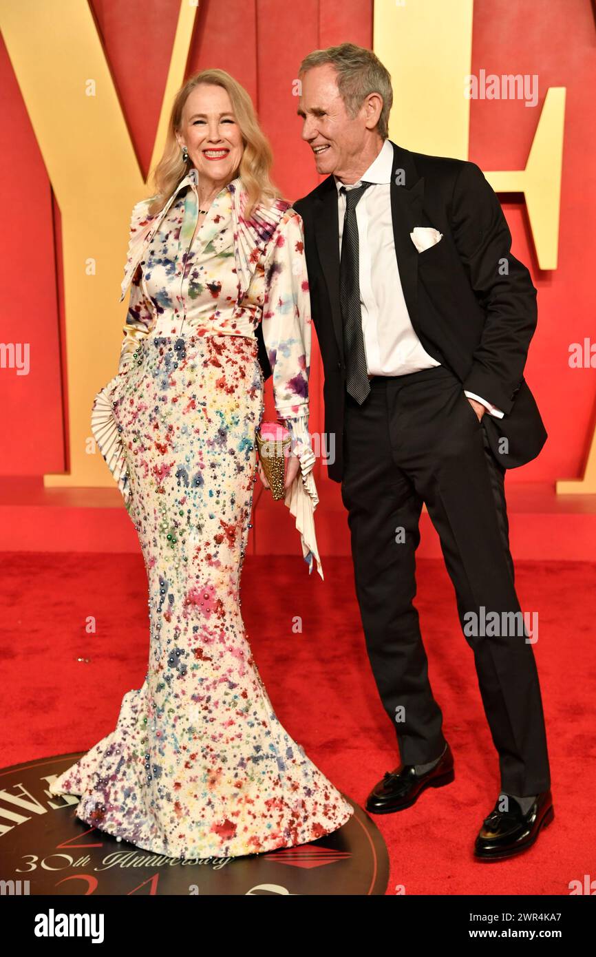 Catherine O'Hara, left, and Bo Welch arrive at the Vanity Fair Oscar ...