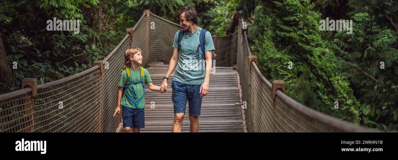father and son tourists in Rope bridge in Yildiz Park. Besiktas ...