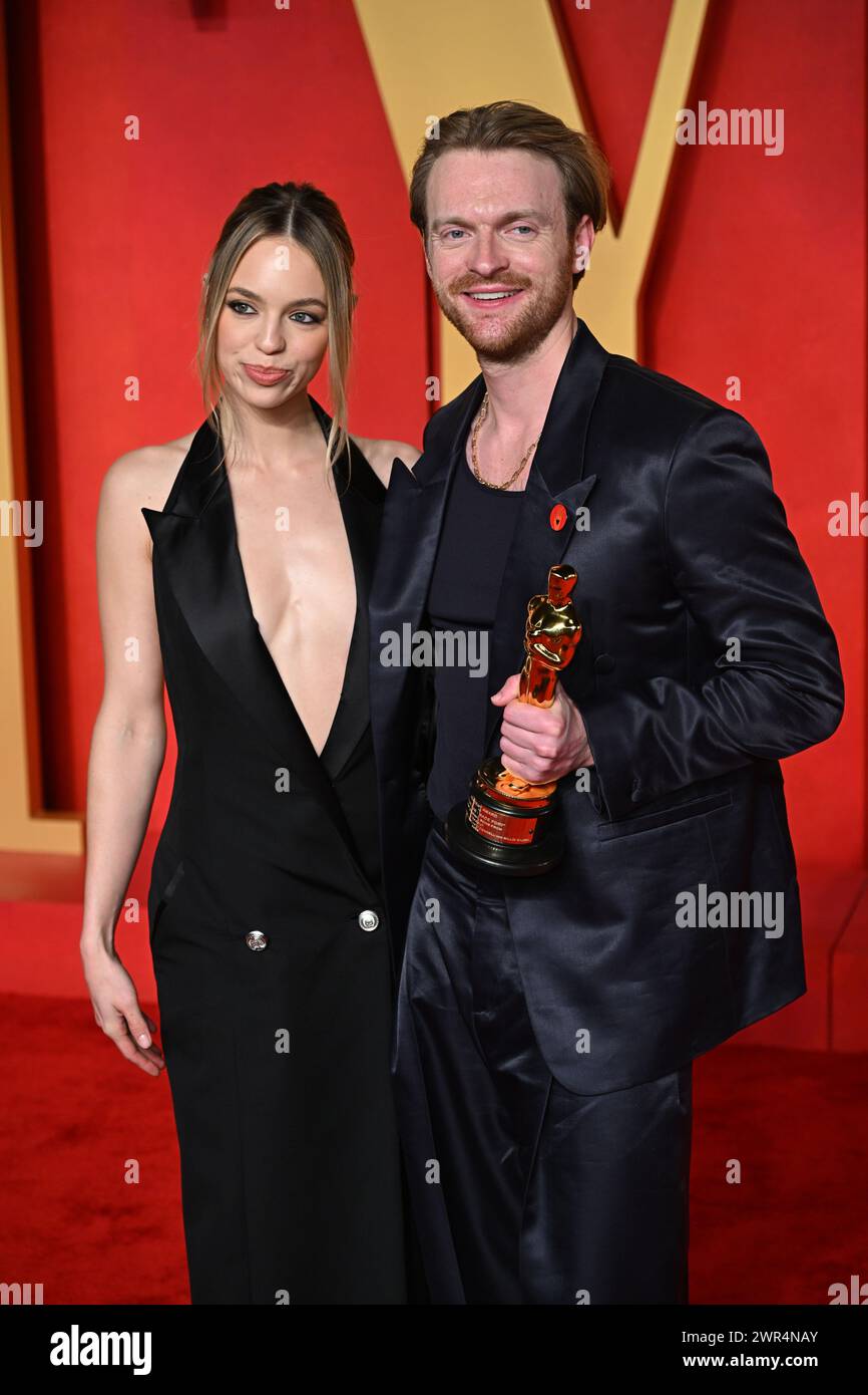 Claudia Sulewski and Finneas O'Connell attending the Vanity Fair Oscar ...