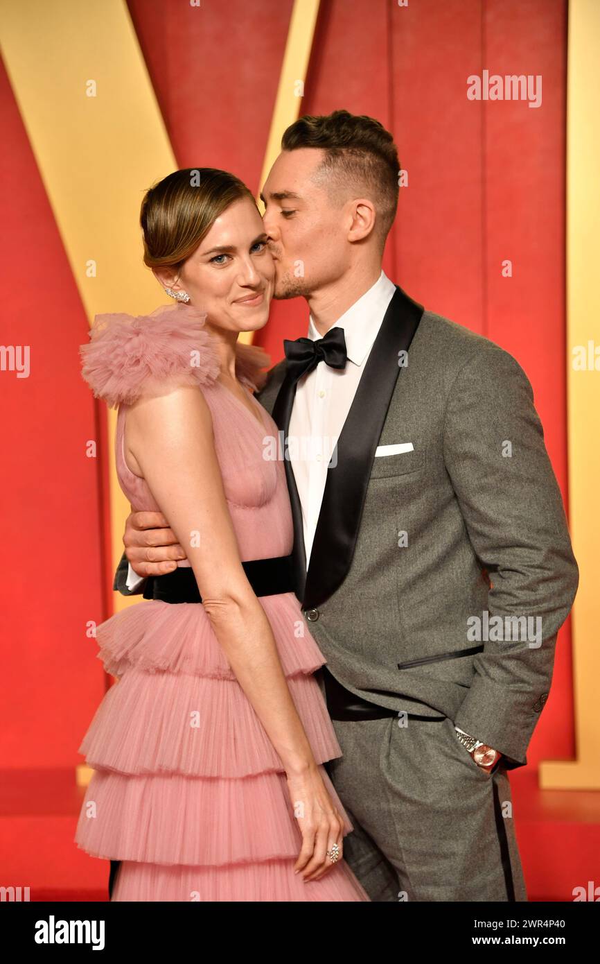 Allison Williams, left, and Alexander Dreymon arrive at the Vanity Fair ...
