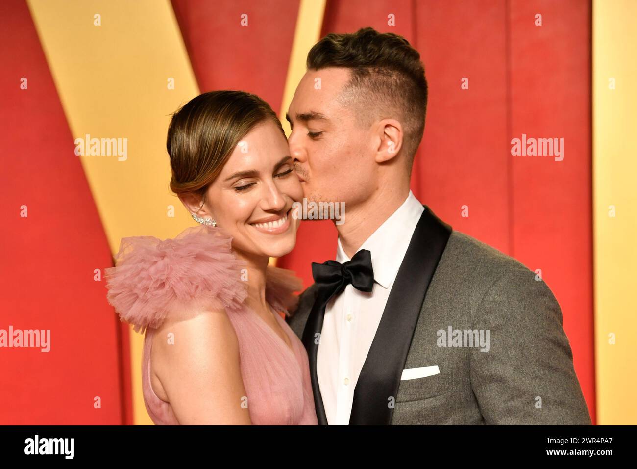 Allison Williams, left, and Alexander Dreymon arrive at the Vanity Fair ...