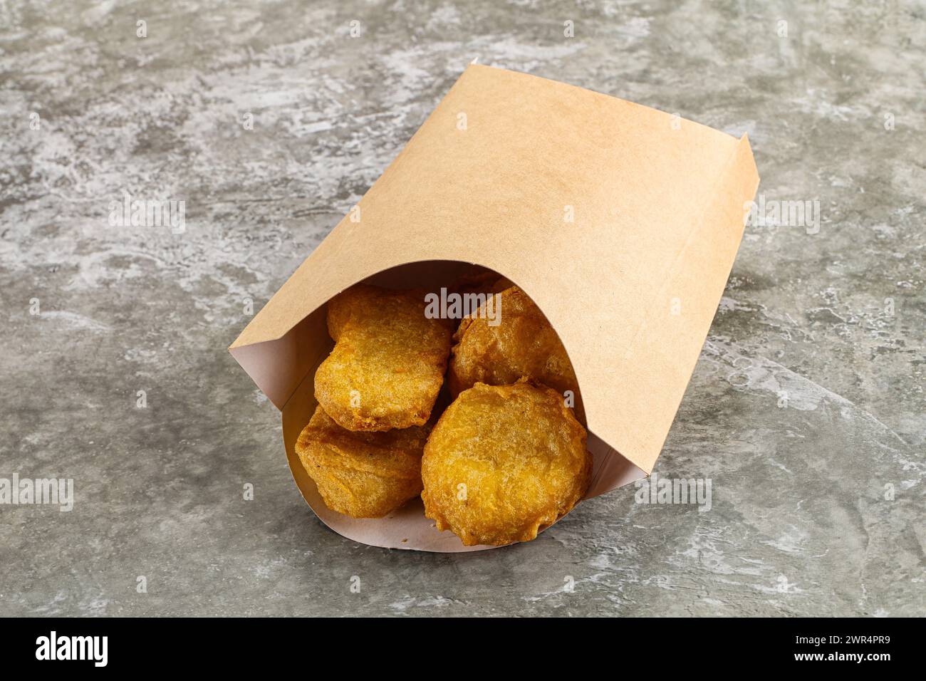 Crunchy crispy chicken nuggets snack heap Stock Photo - Alamy