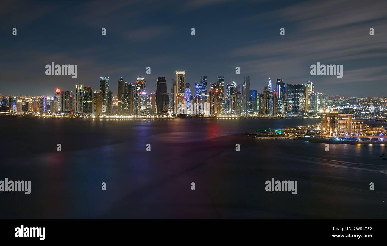 The skyline of Doha, Qatar during sunset Stock Photo - Alamy