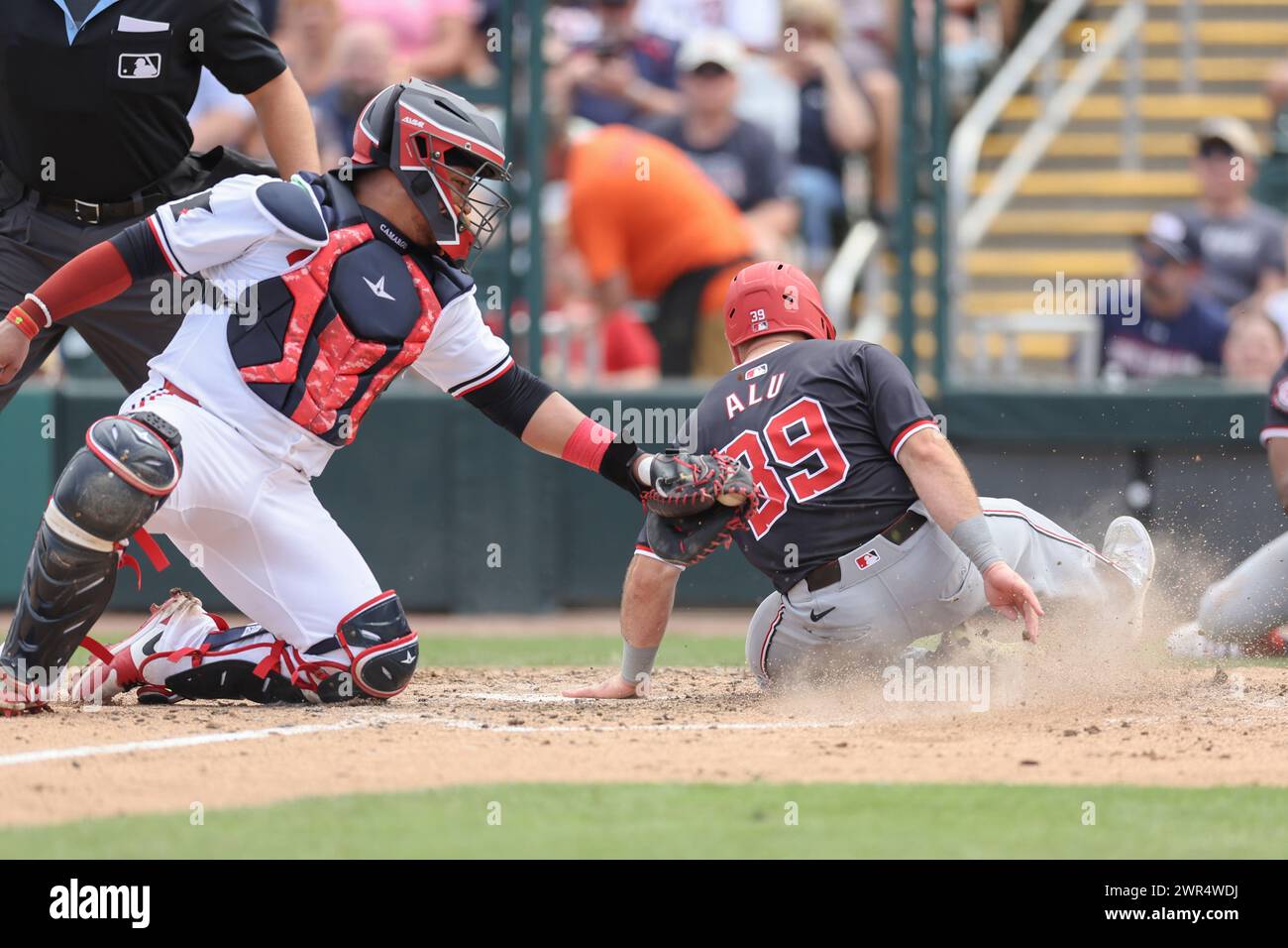 Fort Myers, FL: Washington Nationals third baseman Jake Alu (39) slides ...