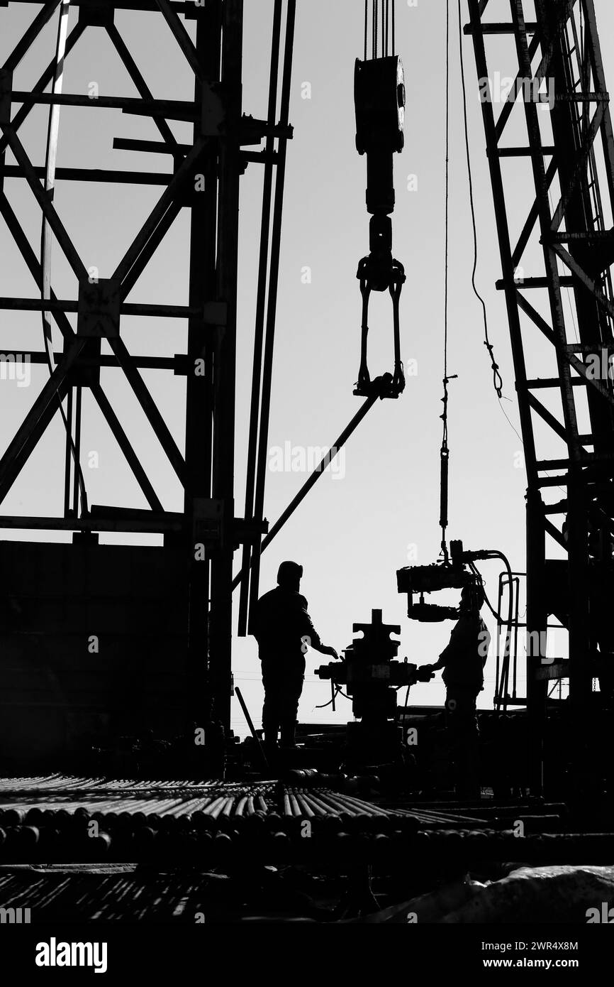 drilling exploration, the oil workers are working Stock Photo - Alamy