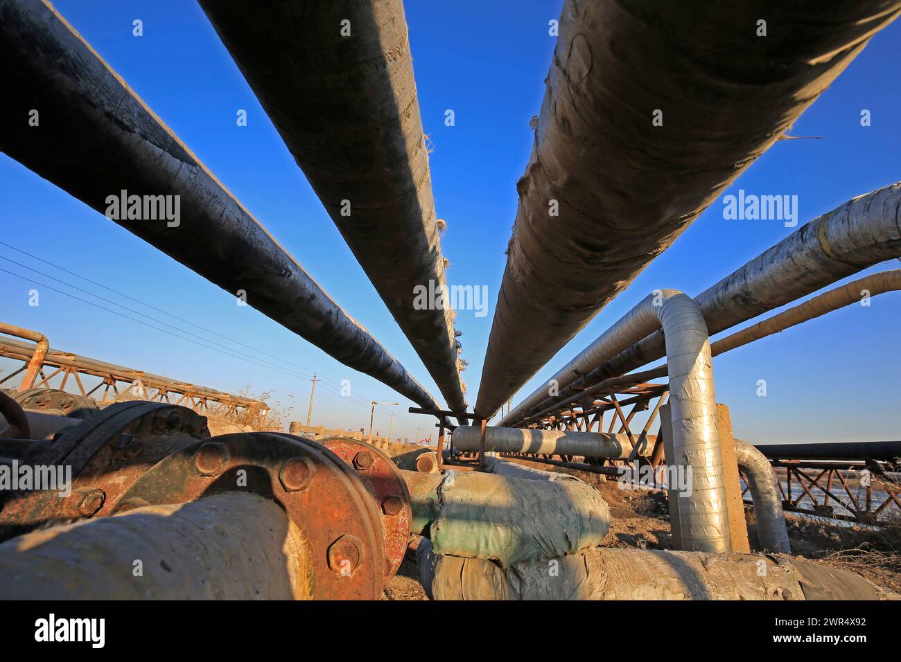 Oilfield equipment and pipeline Stock Photo - Alamy