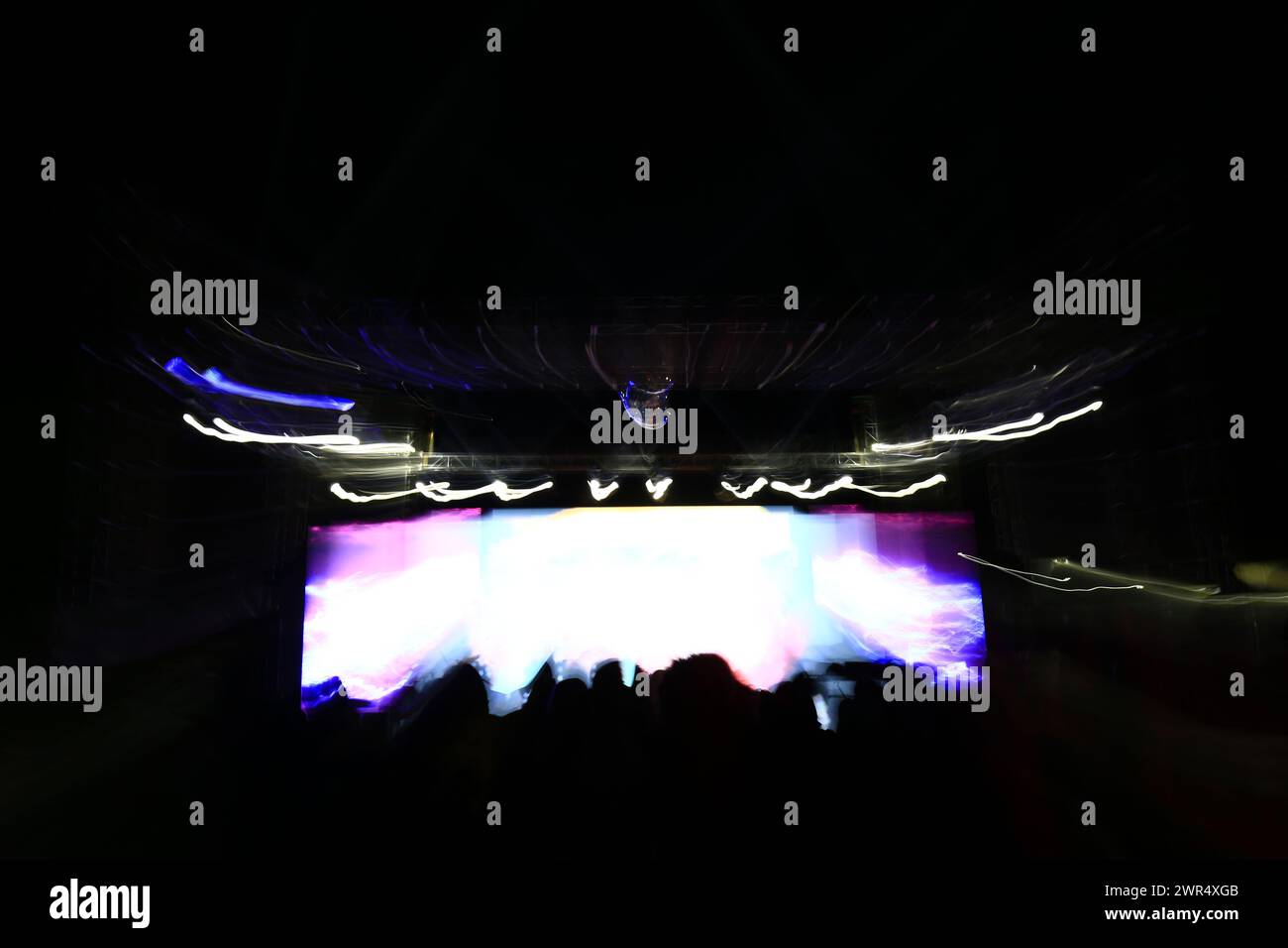 Stage lighting effect in the dark, fuzzy figure Stock Photo - Alamy