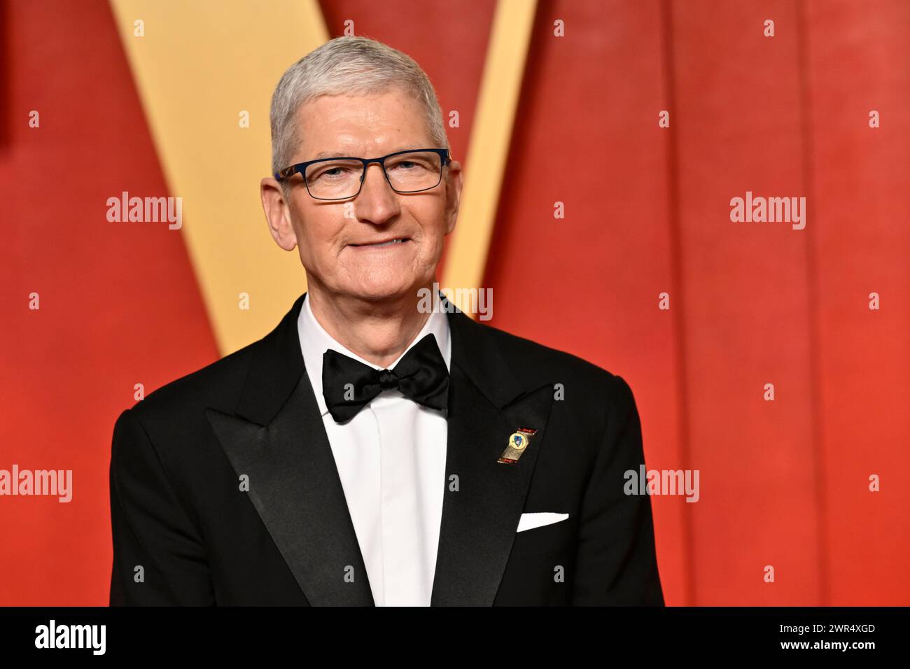 Timothy Cook, chief executive officer of Apple Inc., arrives at the ...