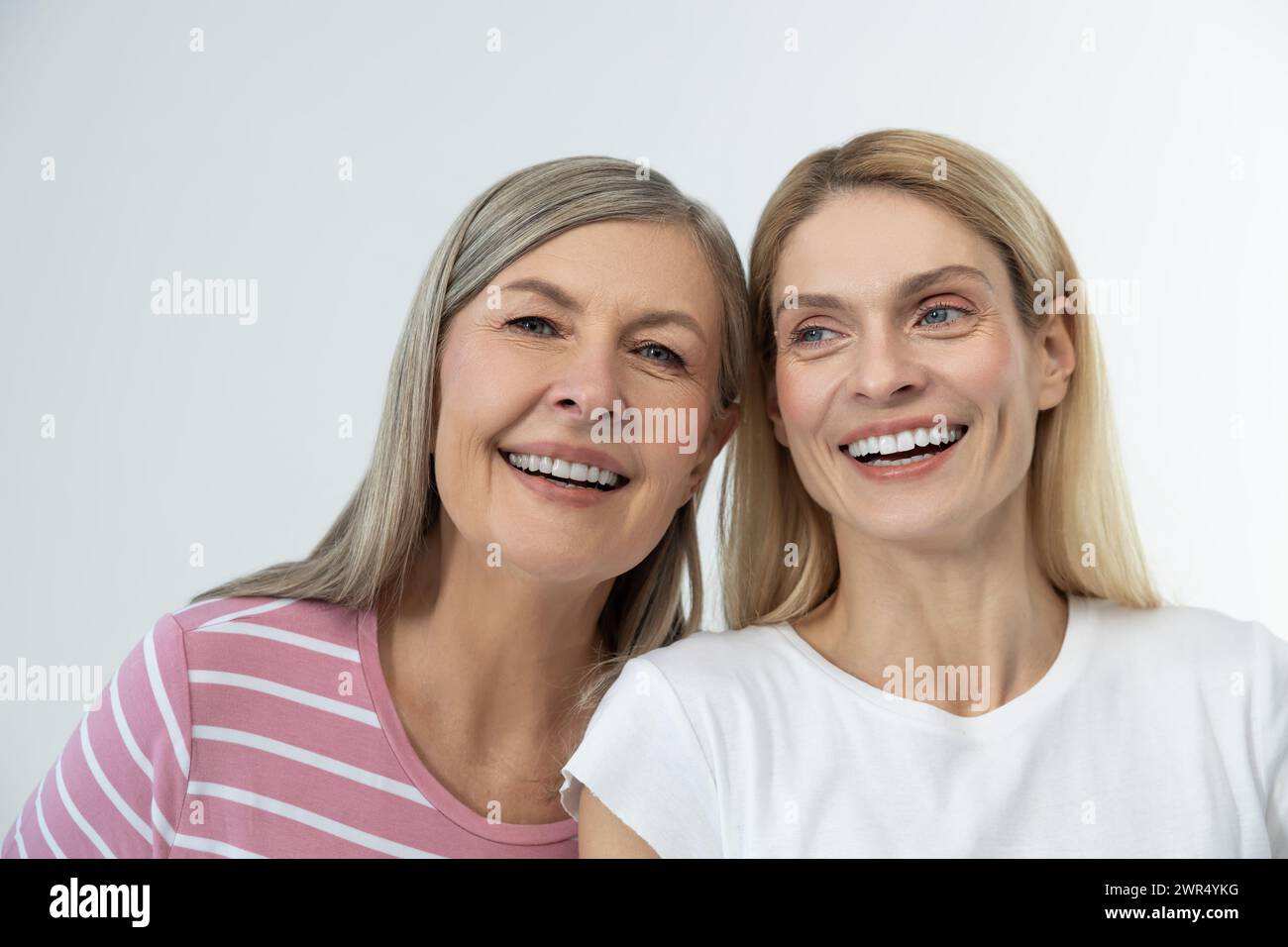 Mother and daughter having good time together and looking happy Stock ...