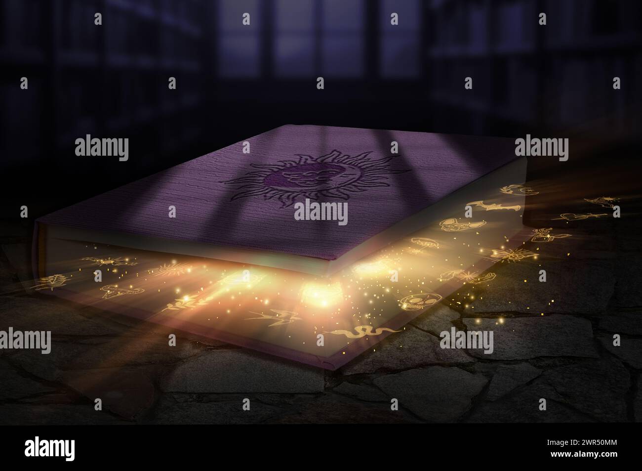 Ancient book of magic on a stone surface with rays of light coming out ...