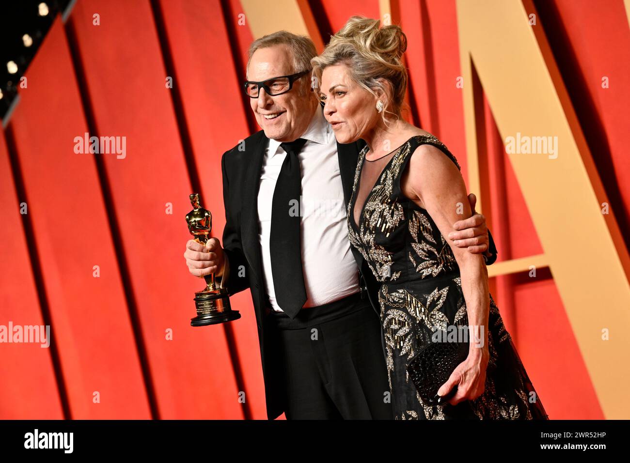 Charles Roven, left, and Stephanie Haymes Roven arrive at the Vanity ...