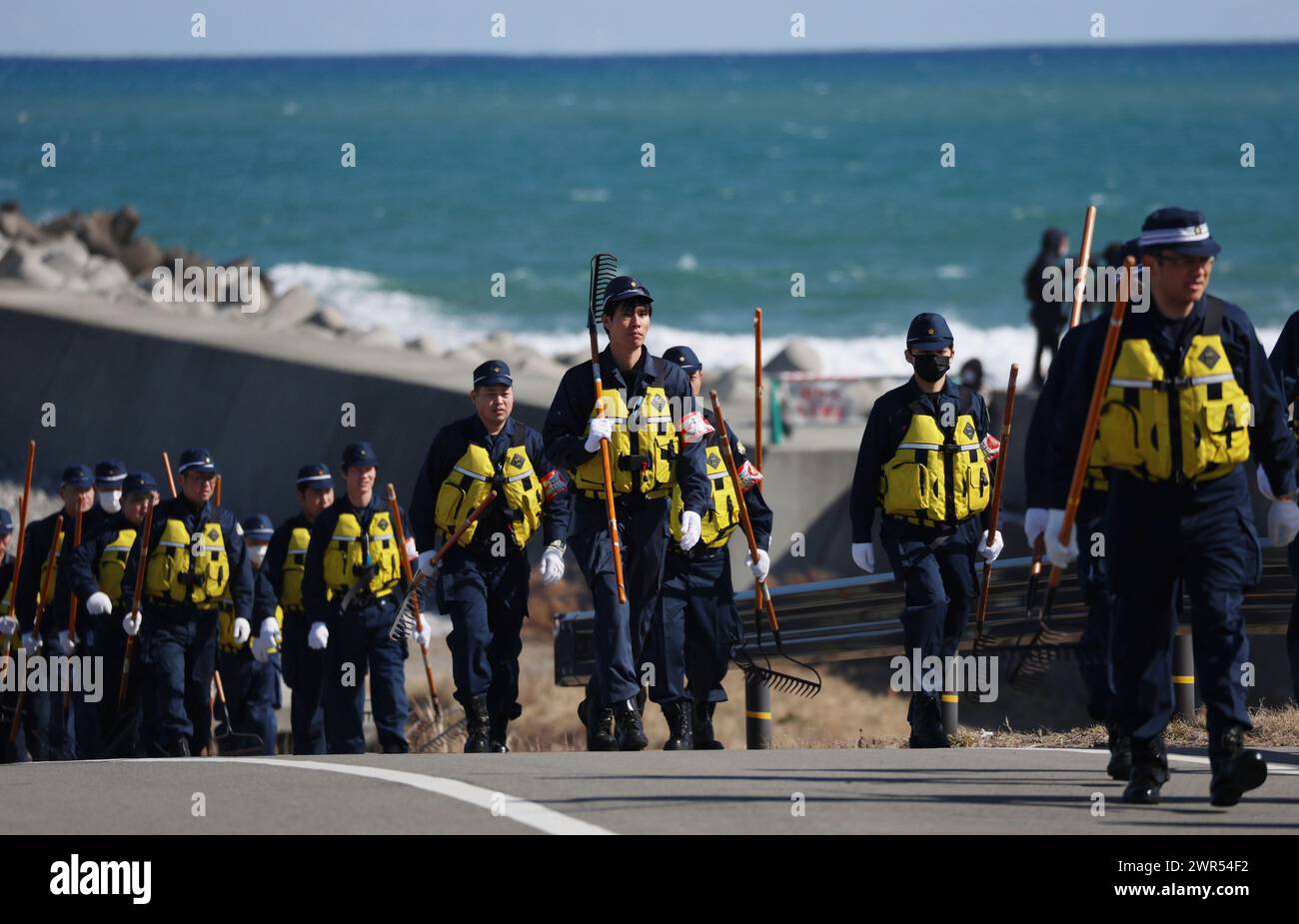 Police officers condunct a searching operation for missing people of ...