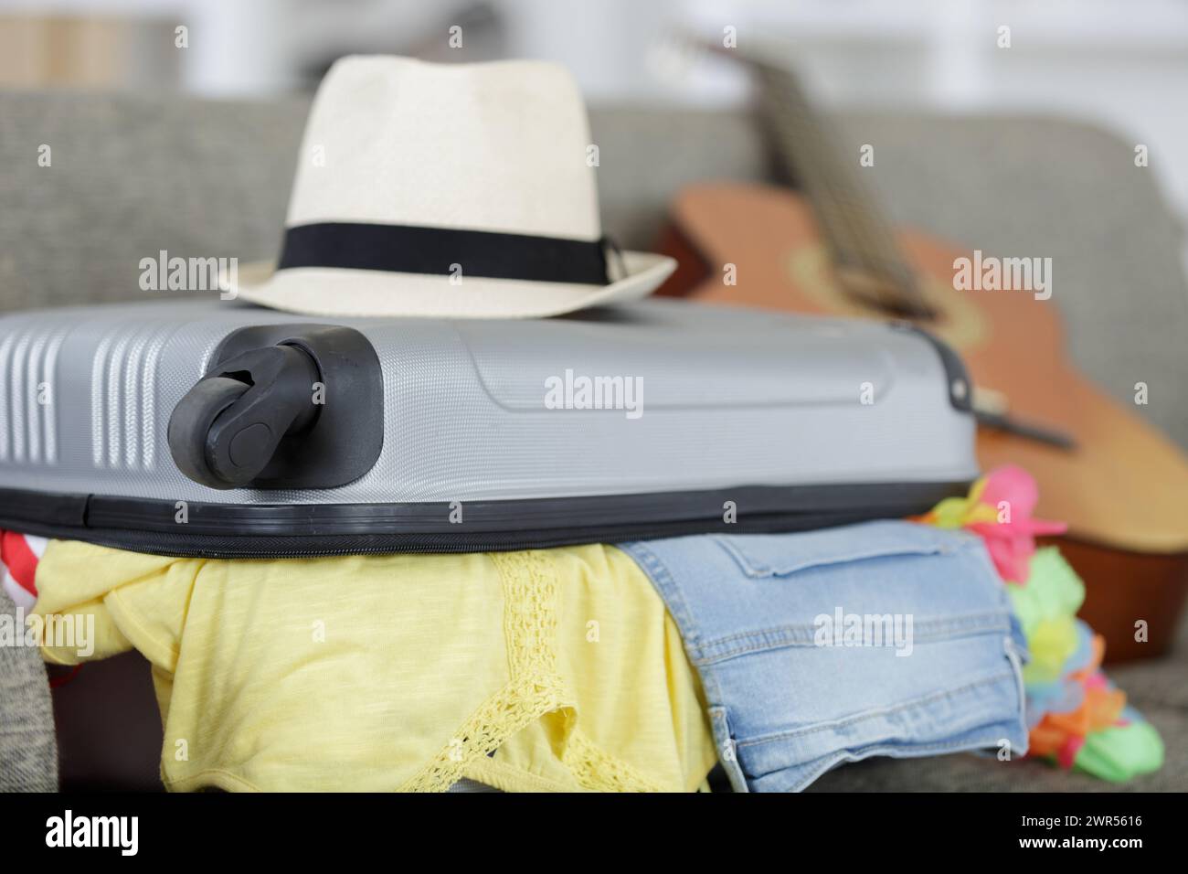 Suitcase and guitar hi-res stock photography and images - Alamy