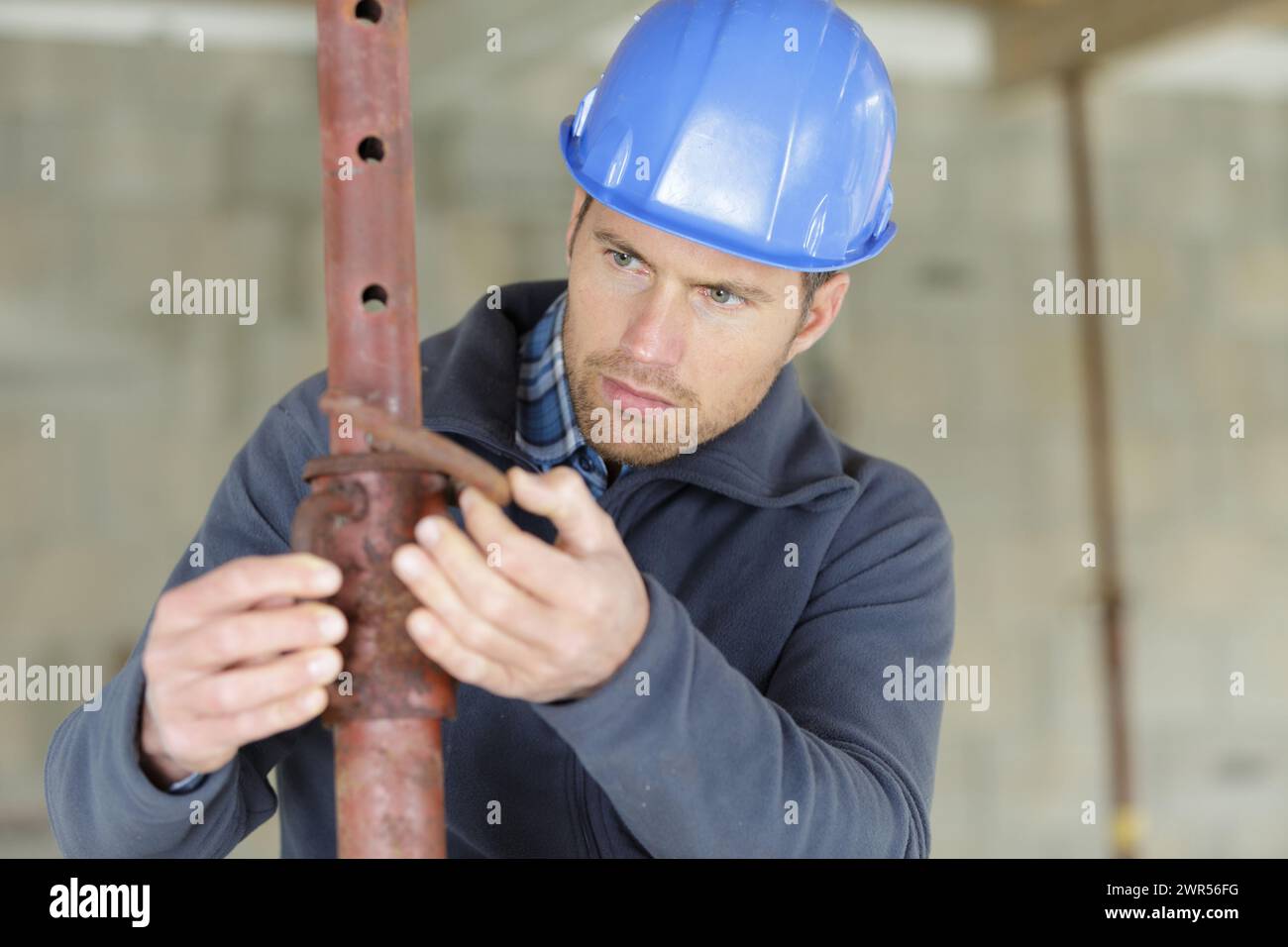 a working man on metal structure Stock Photo - Alamy