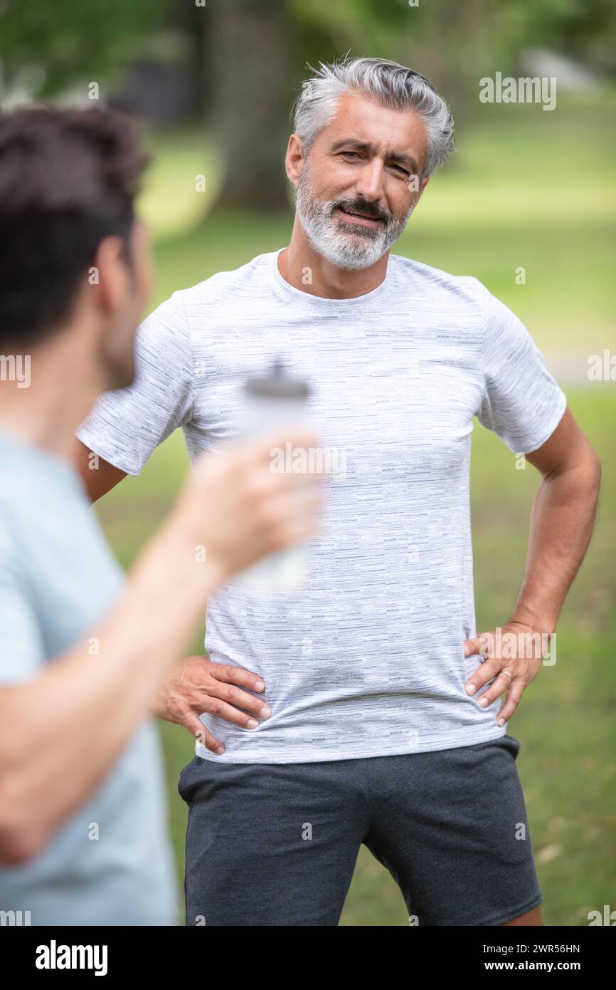 Two men resting after outdoor hi-res stock photography and images - Alamy