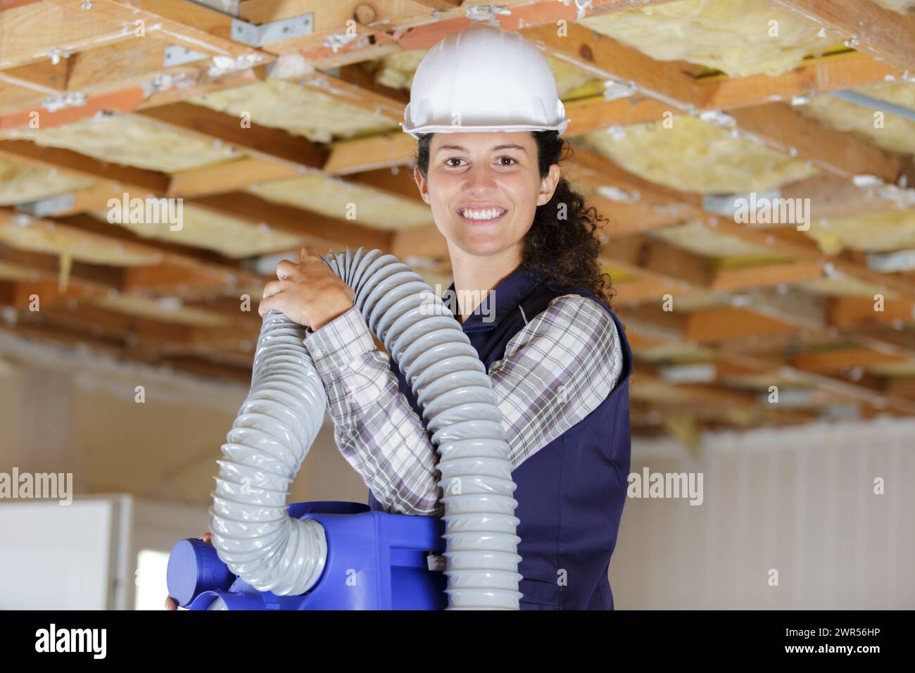 woman assembling the ventilation box Stock Photo - Alamy