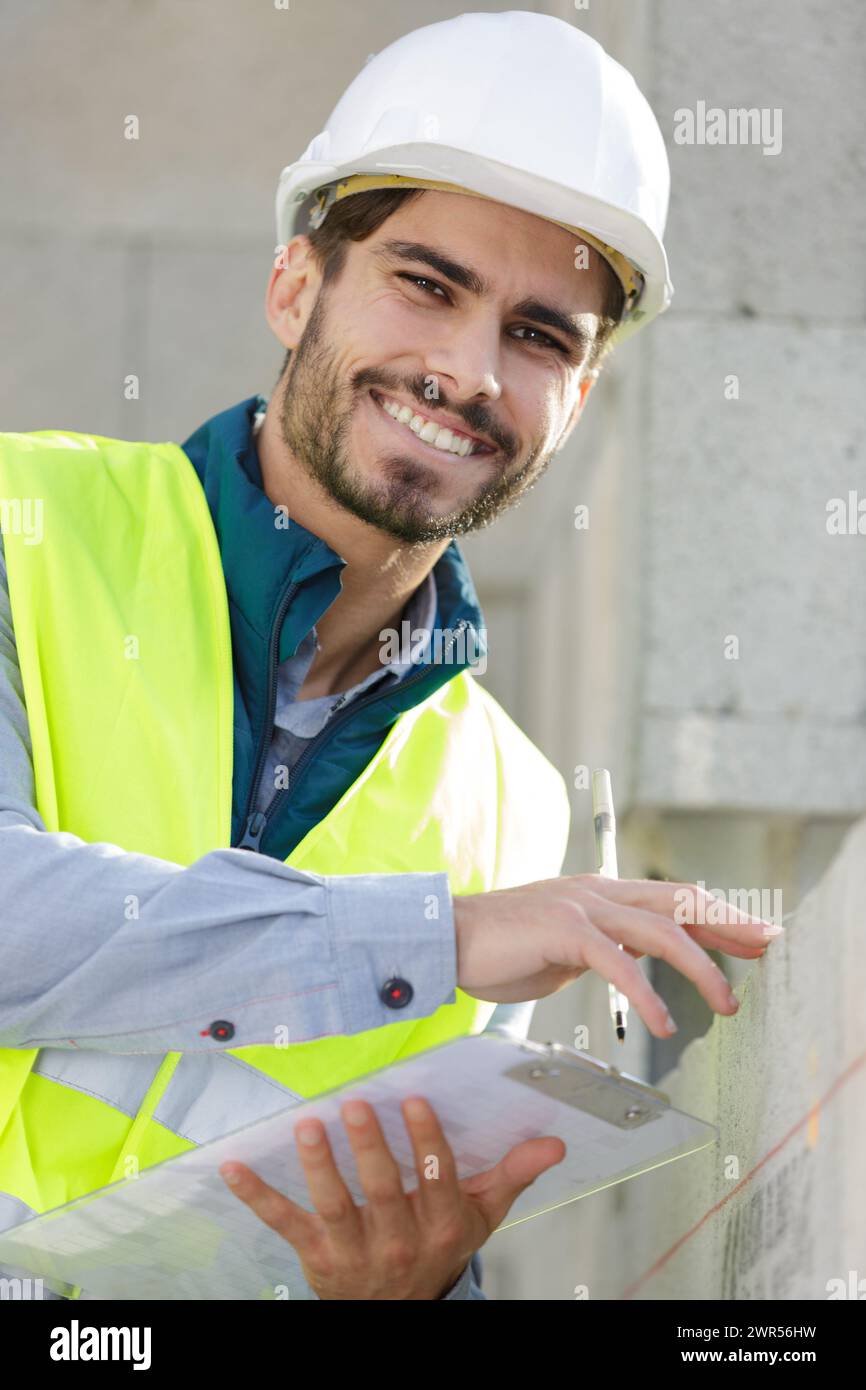 Engineer holding pencil writing hi-res stock photography and images - Alamy