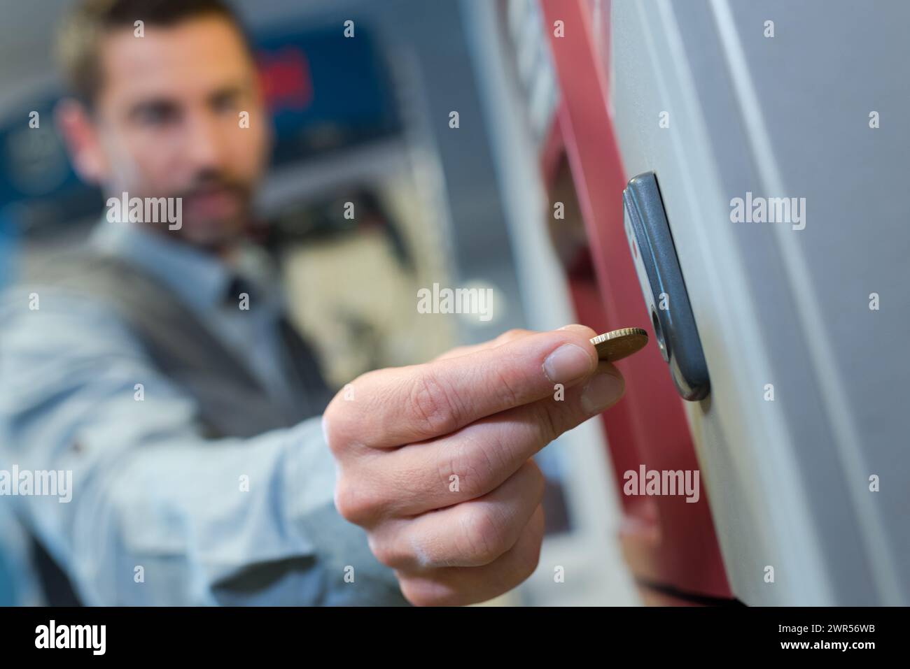 Man paying ticket vending hi-res stock photography and images - Alamy