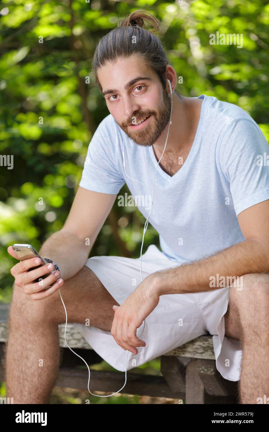 youthful guy having break while training outdoor Stock Photo - Alamy
