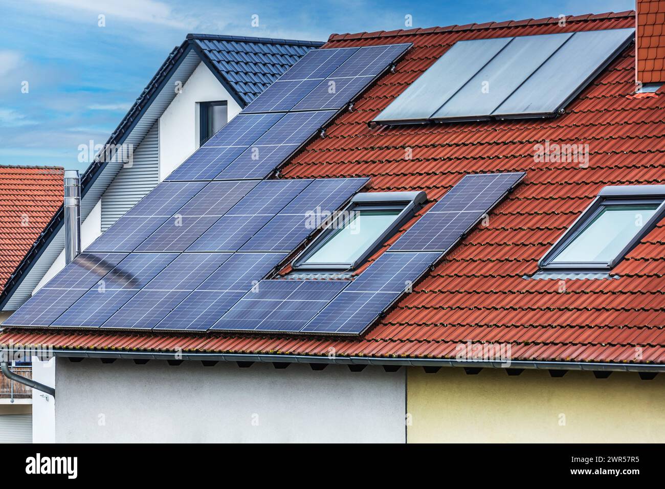Photovoltaic panels on the roof of family house, solar panels ...
