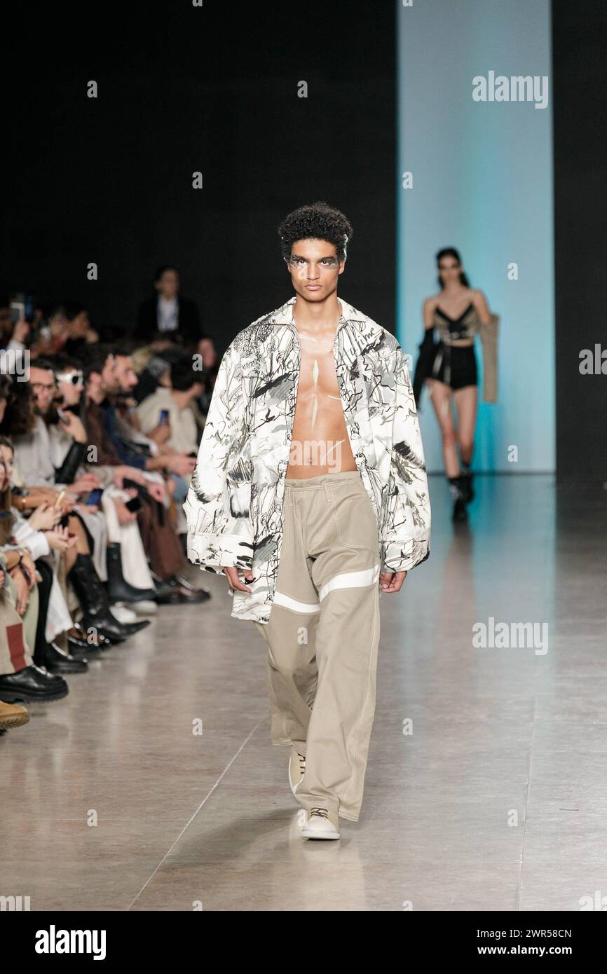 A model walks the runway at the DuarteHajime show during the Lisbon ...