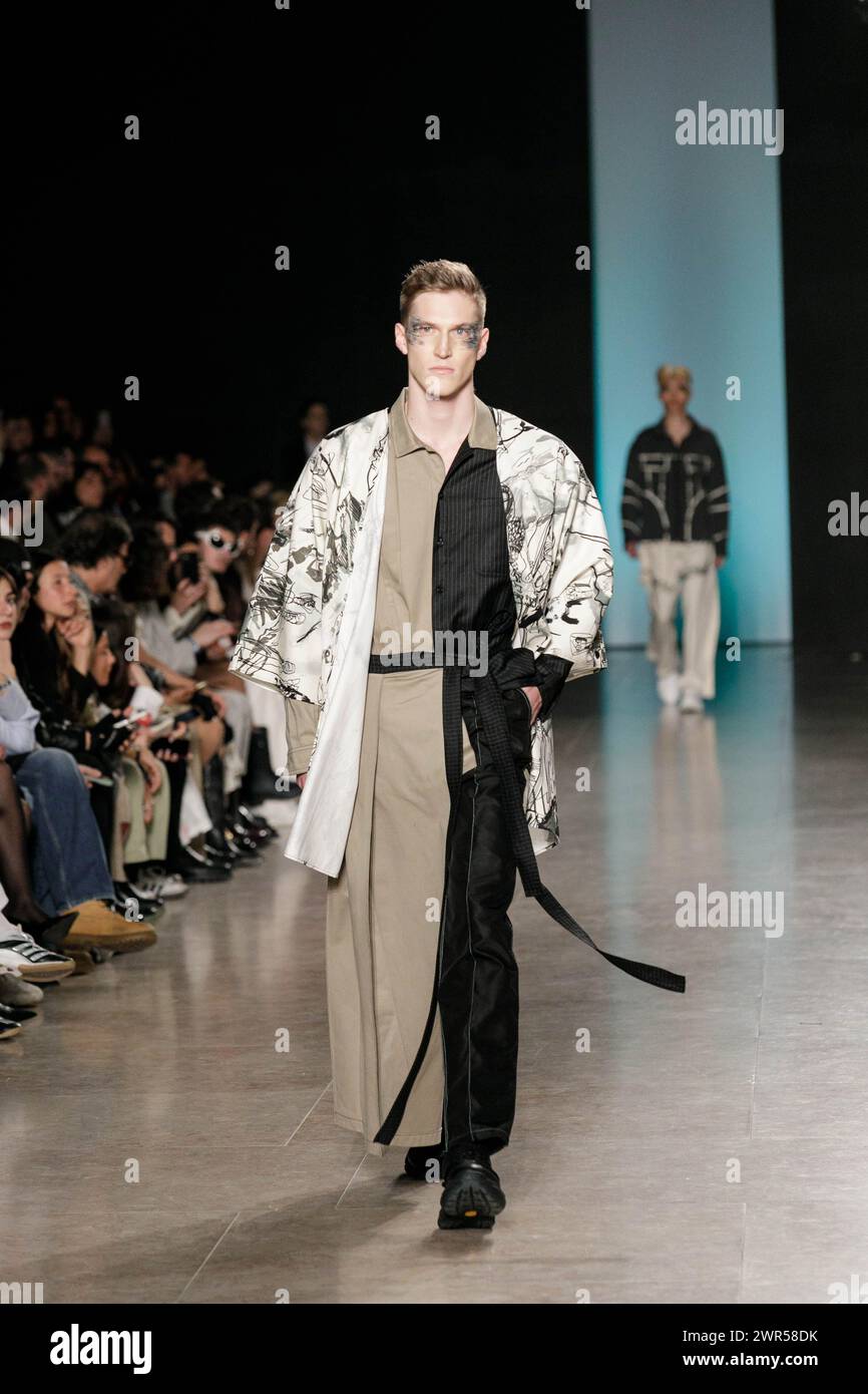 A model walks the runway at the DuarteHajime show during the Lisbon ...