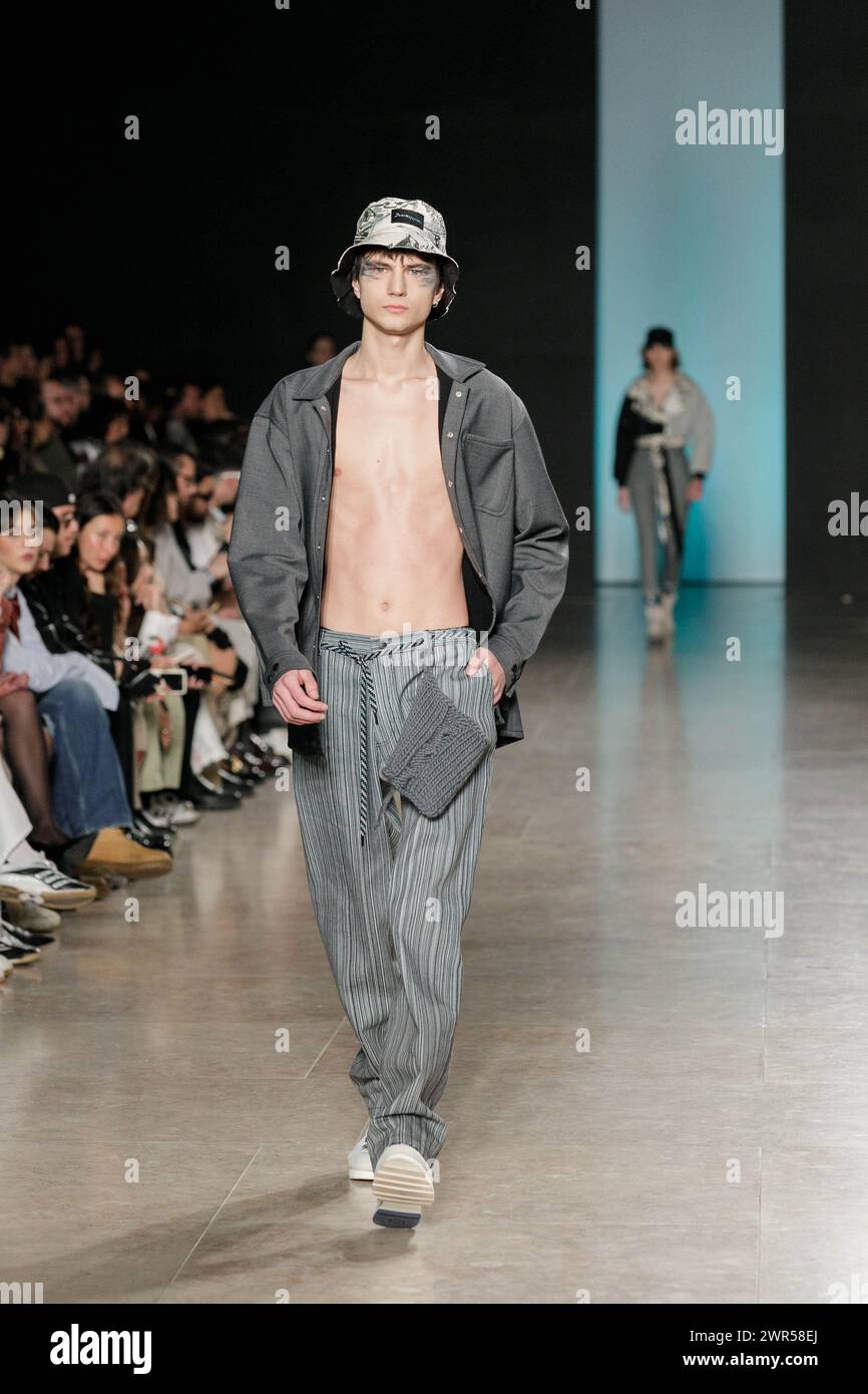 A model walks the runway at the DuarteHajime show during the Lisbon ...