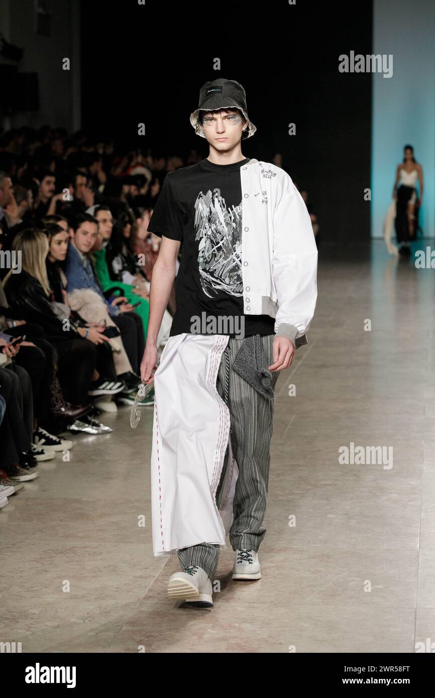 A model walks the runway at the DuarteHajime show during the Lisbon ...