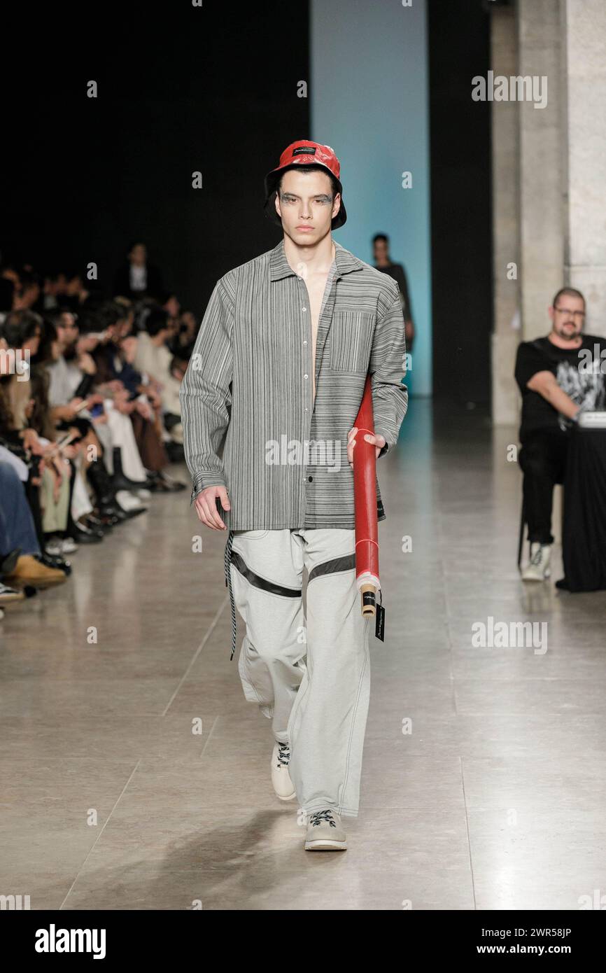 A model walks the runway at the DuarteHajime show during the Lisbon ...