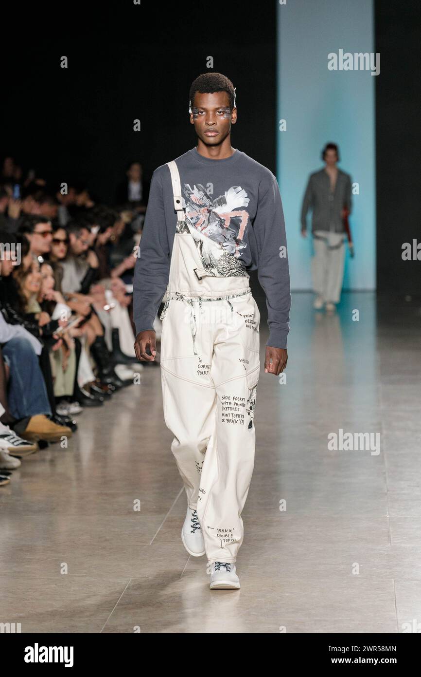 A model walks the runway at the DuarteHajime show during the Lisbon ...