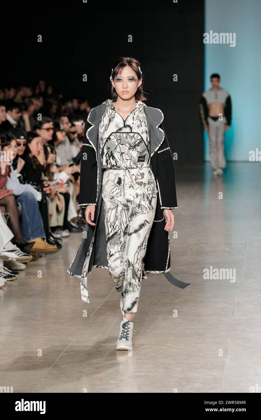 A model walks the runway at the DuarteHajime show during the Lisbon ...