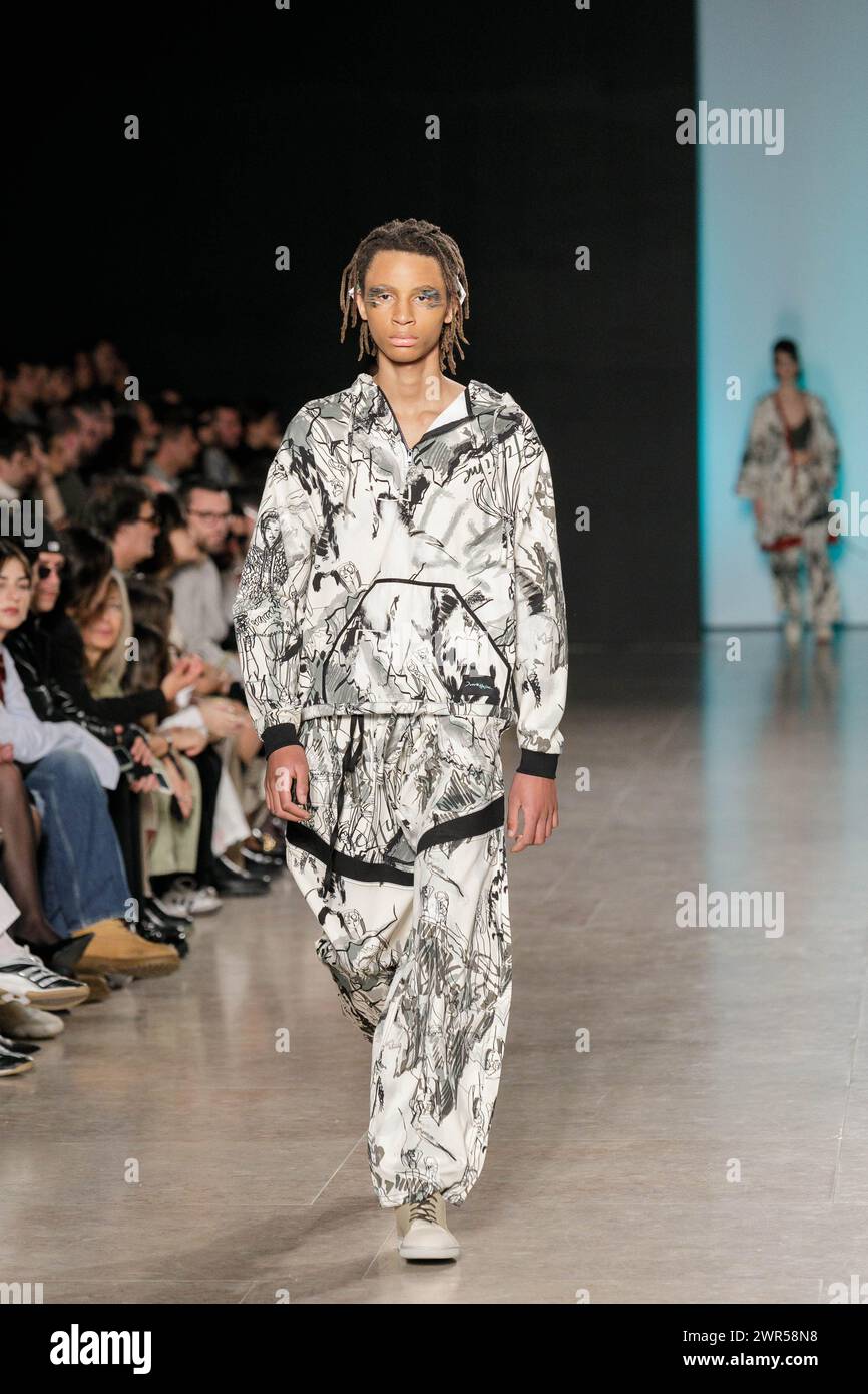 A model walks the runway at the DuarteHajime show during the Lisbon ...