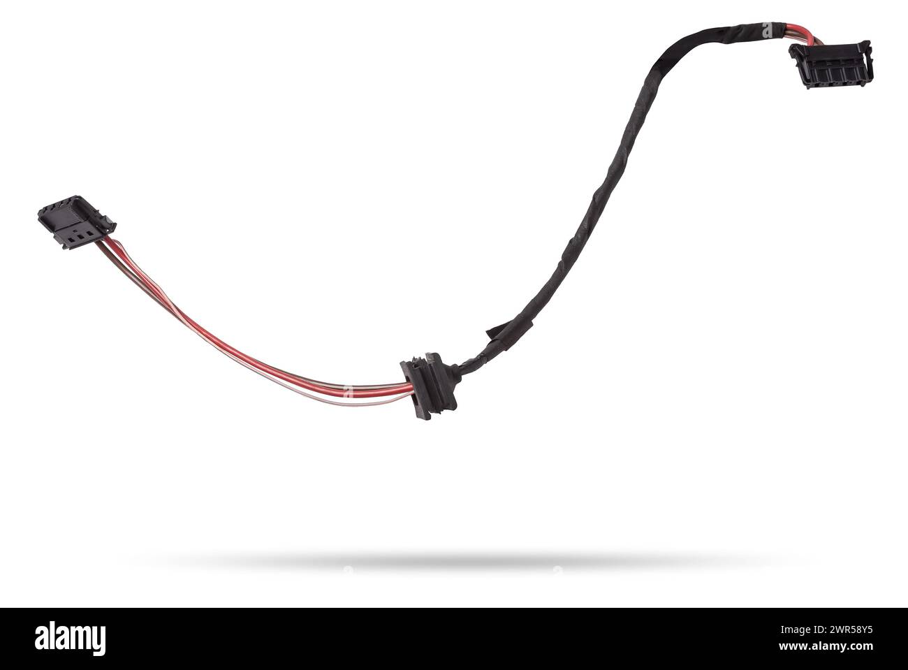 A cable of matted wires of different colors with connectors in the ...