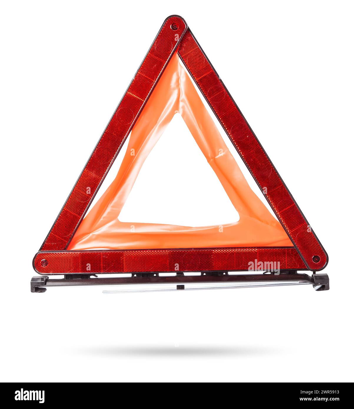 Warning stop sign made of red reflective plastic with a blue case on a ...