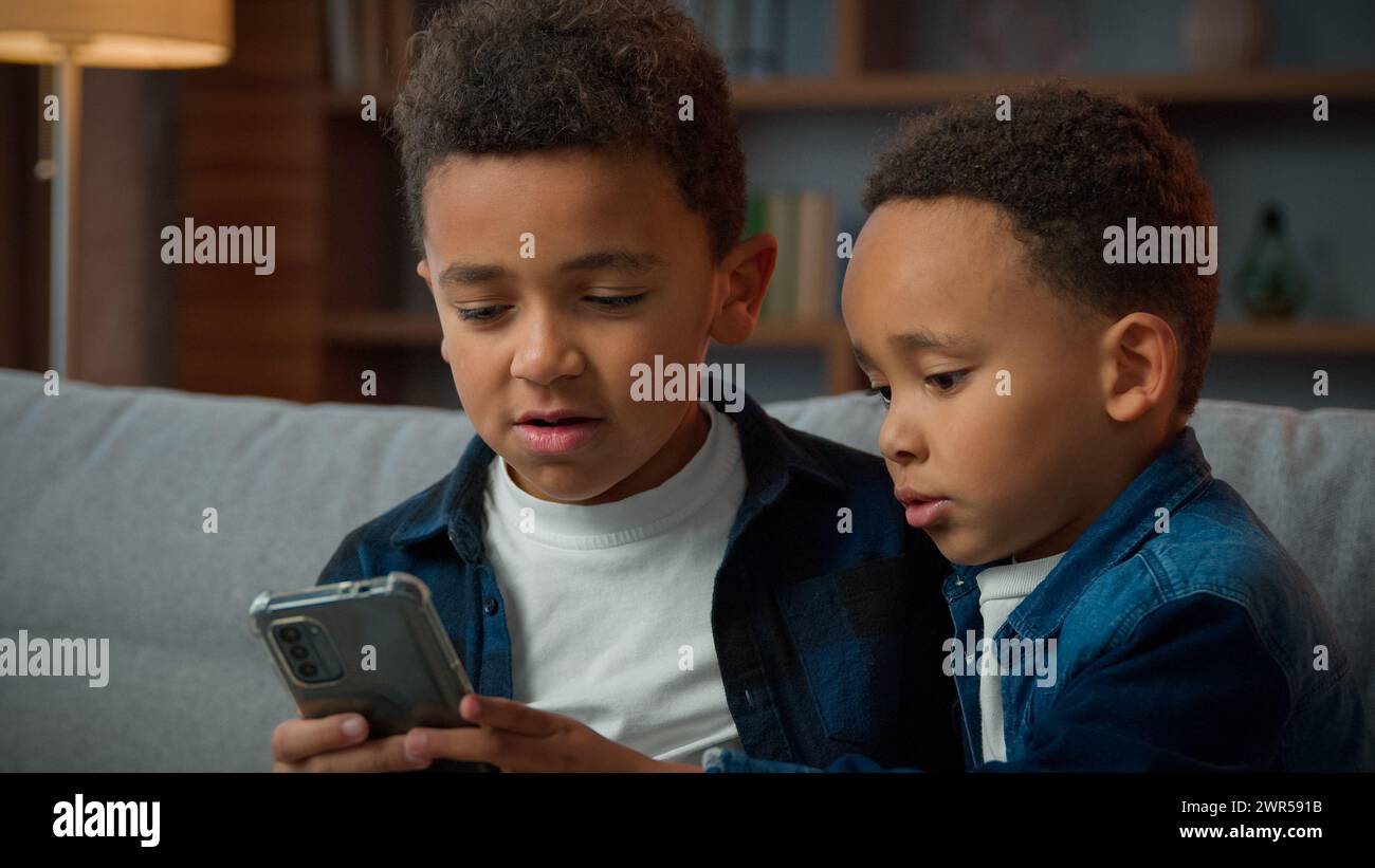 Two siblings African American brothers sons children boys friends ...