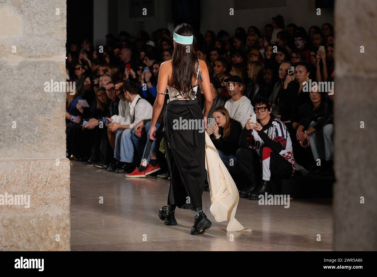 Lisbon, Portugal. 10th Mar, 2024. A model walks the runway during the ...
