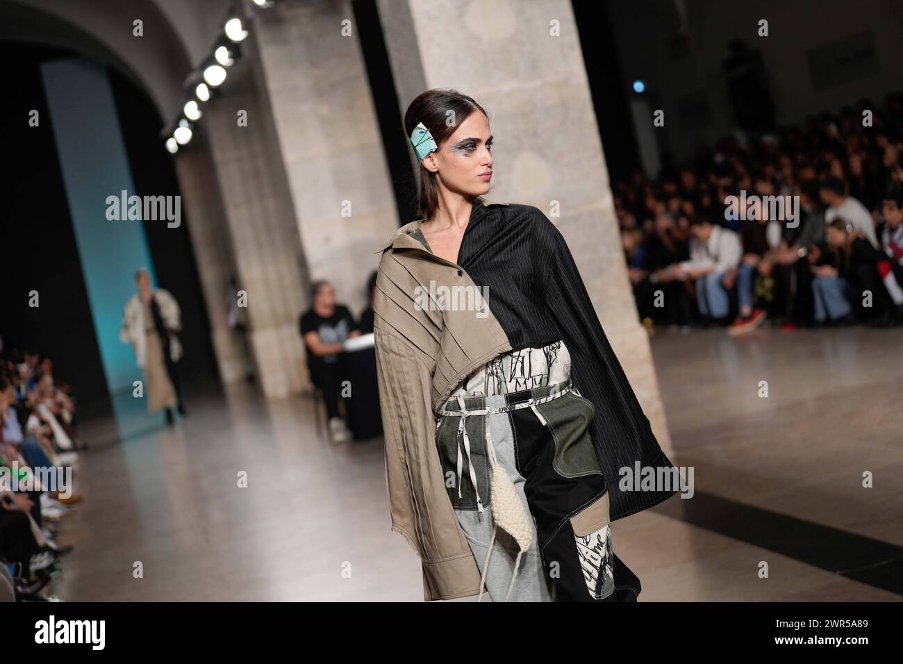 Lisbon, Portugal. 10th Mar, 2024. A model walks the runway during the ...