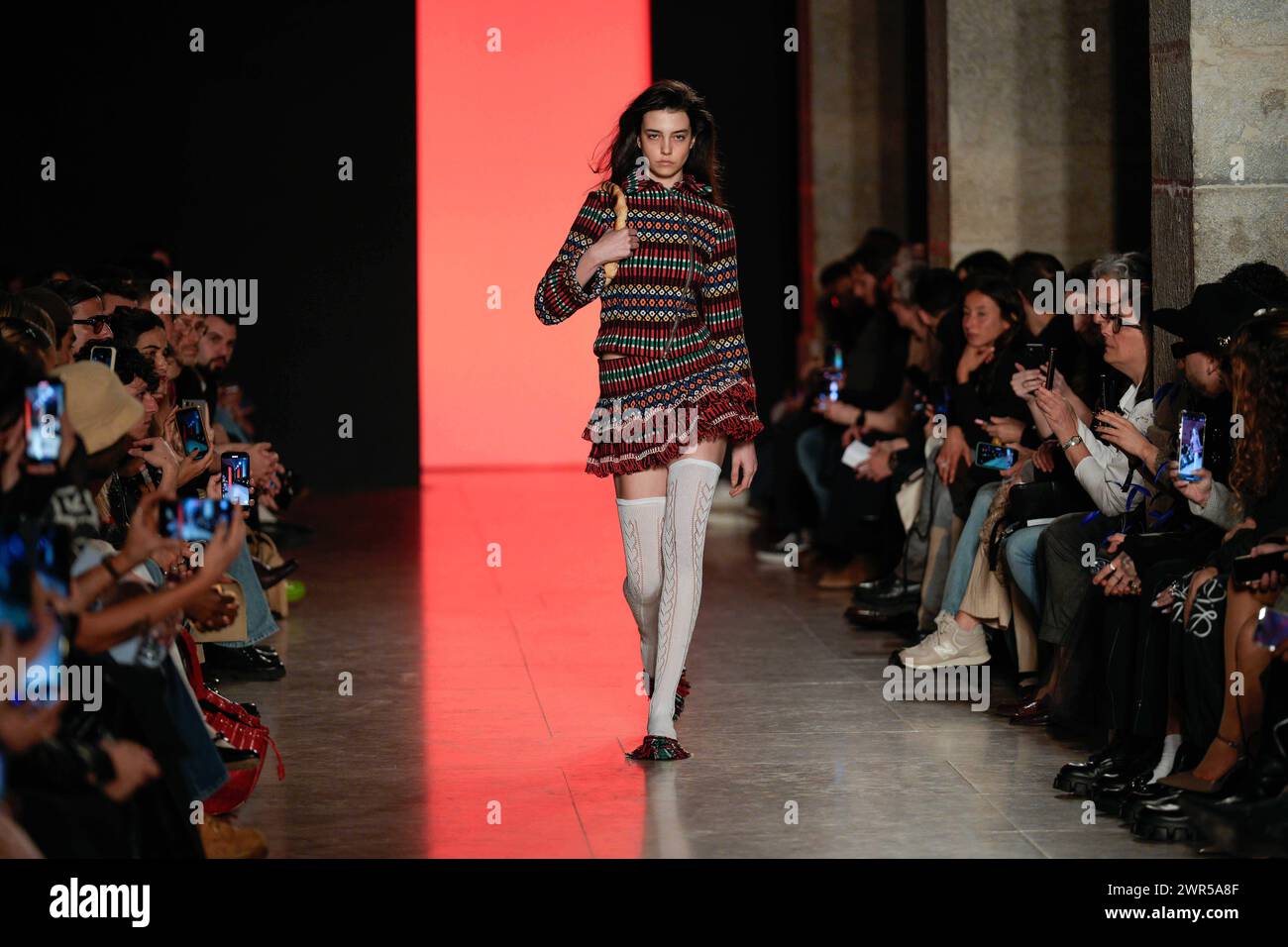 Lisbon, Portugal. 10th Mar, 2024. A model walks the runway during the ...