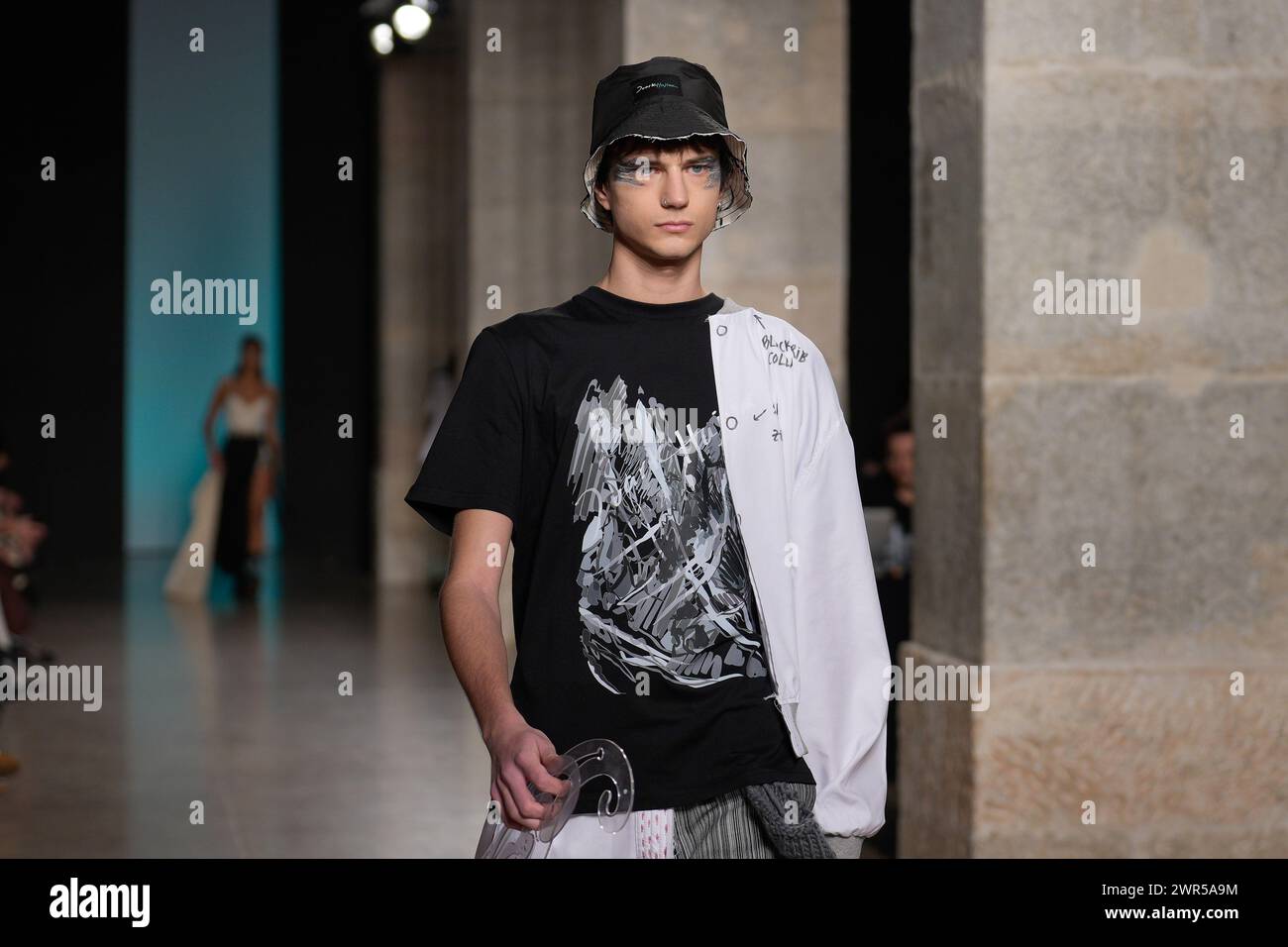 Lisbon, Portugal. 10th Mar, 2024. A model walks the runway during the ...
