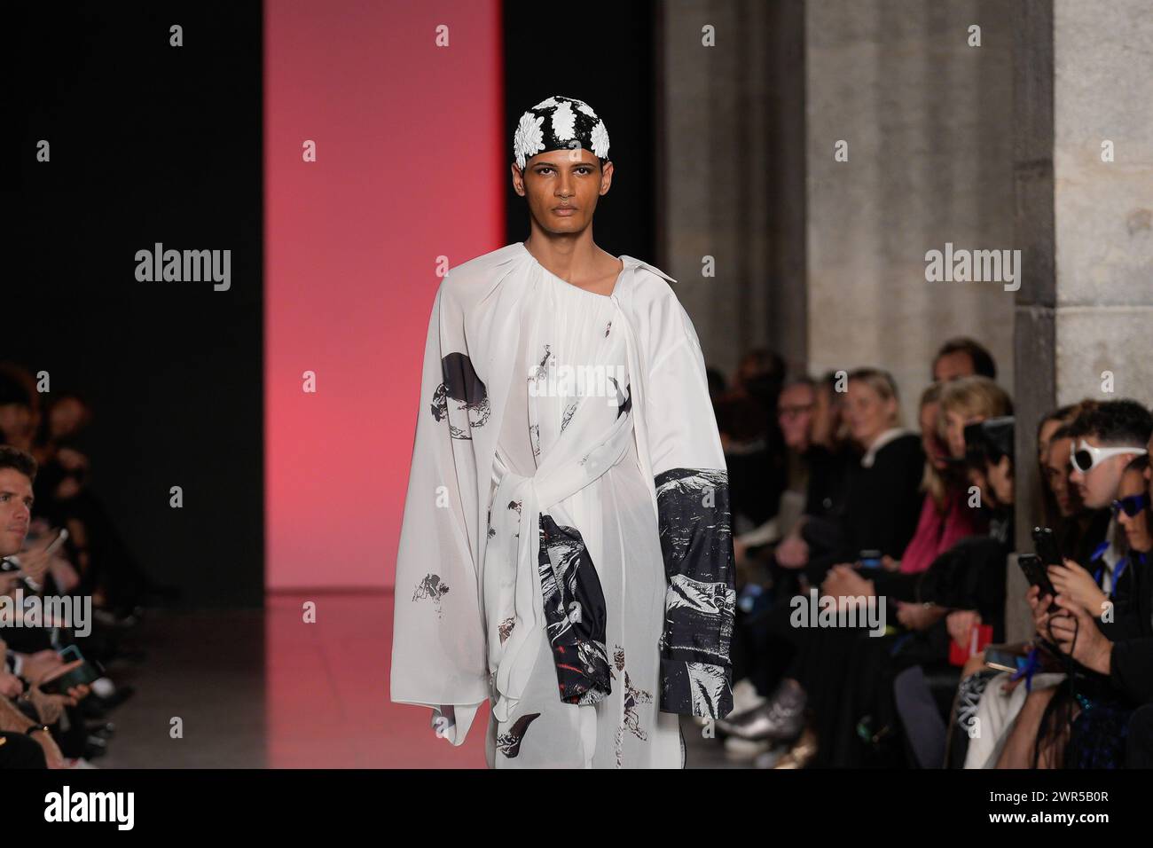 Lisbon, Portugal. 10th Mar, 2024. A model walks the runway during the ...