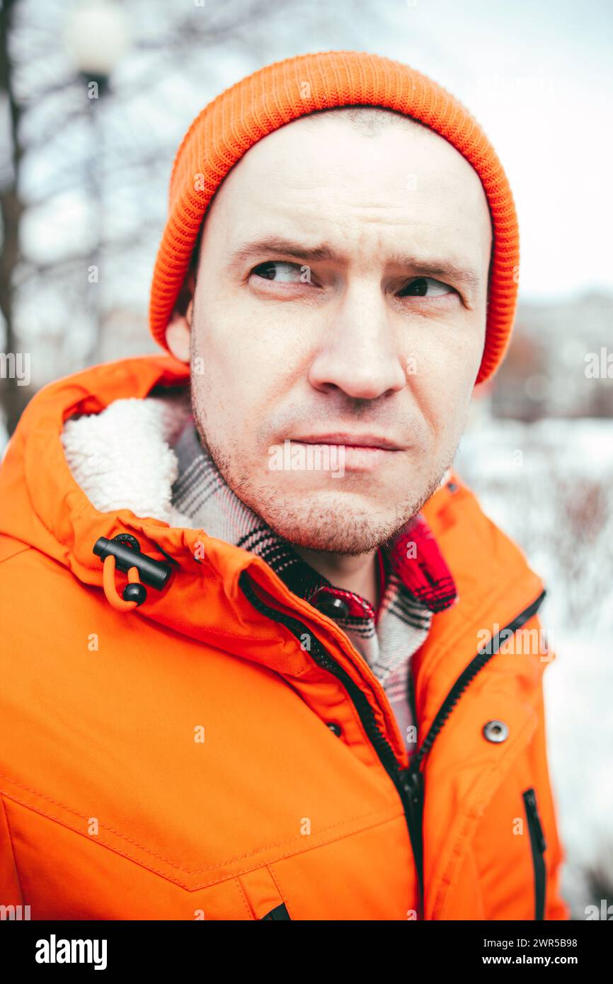 Person in orange jacket hi-res stock photography and images - Alamy