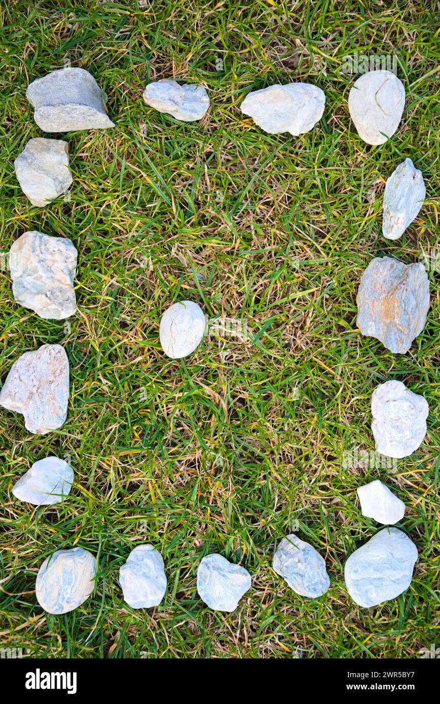 Stone Egg In A Rectangle Of Natural Stones In A Green Meadow ...