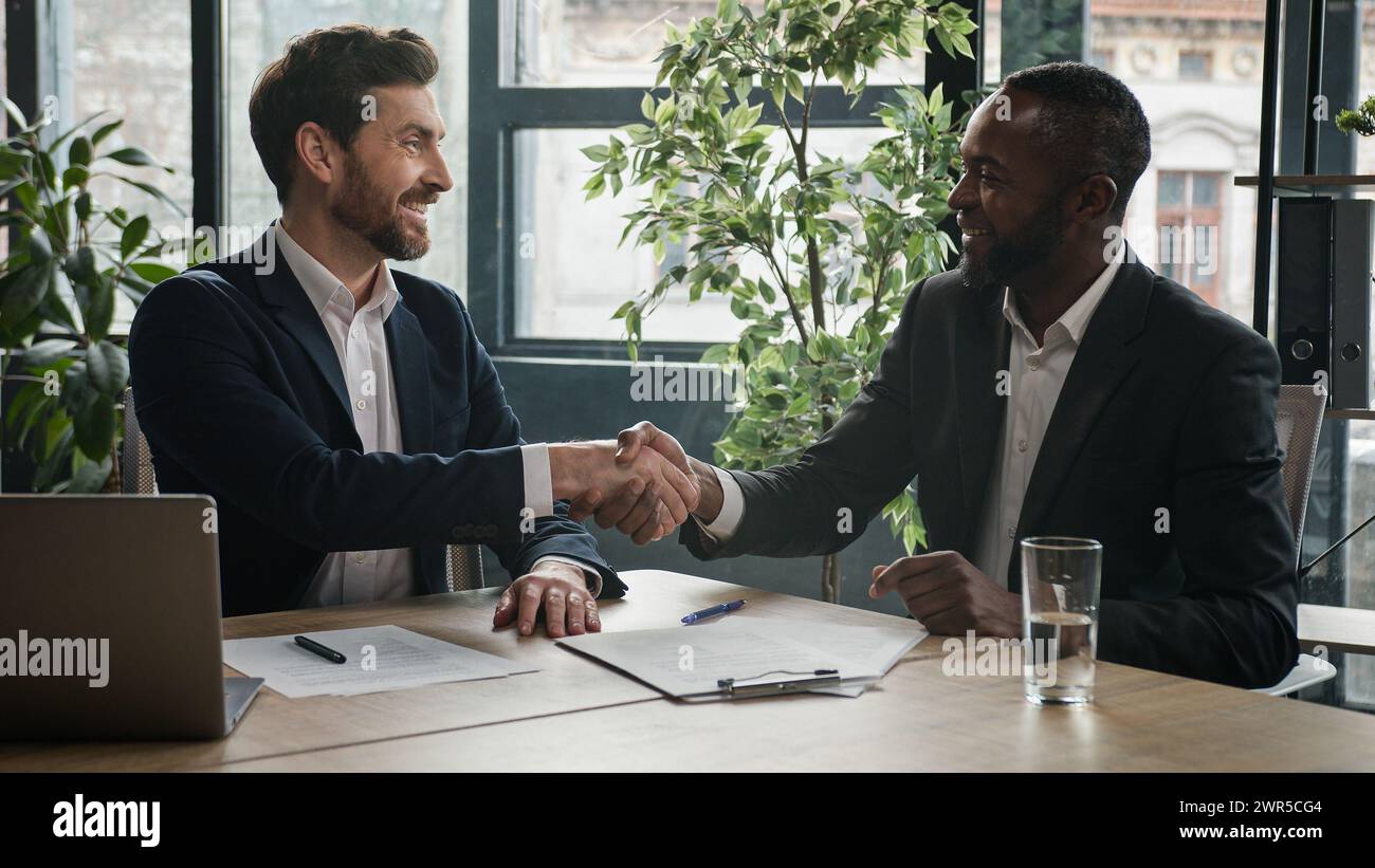 Two diverse multiracial businessmen Caucasian man and African American ...