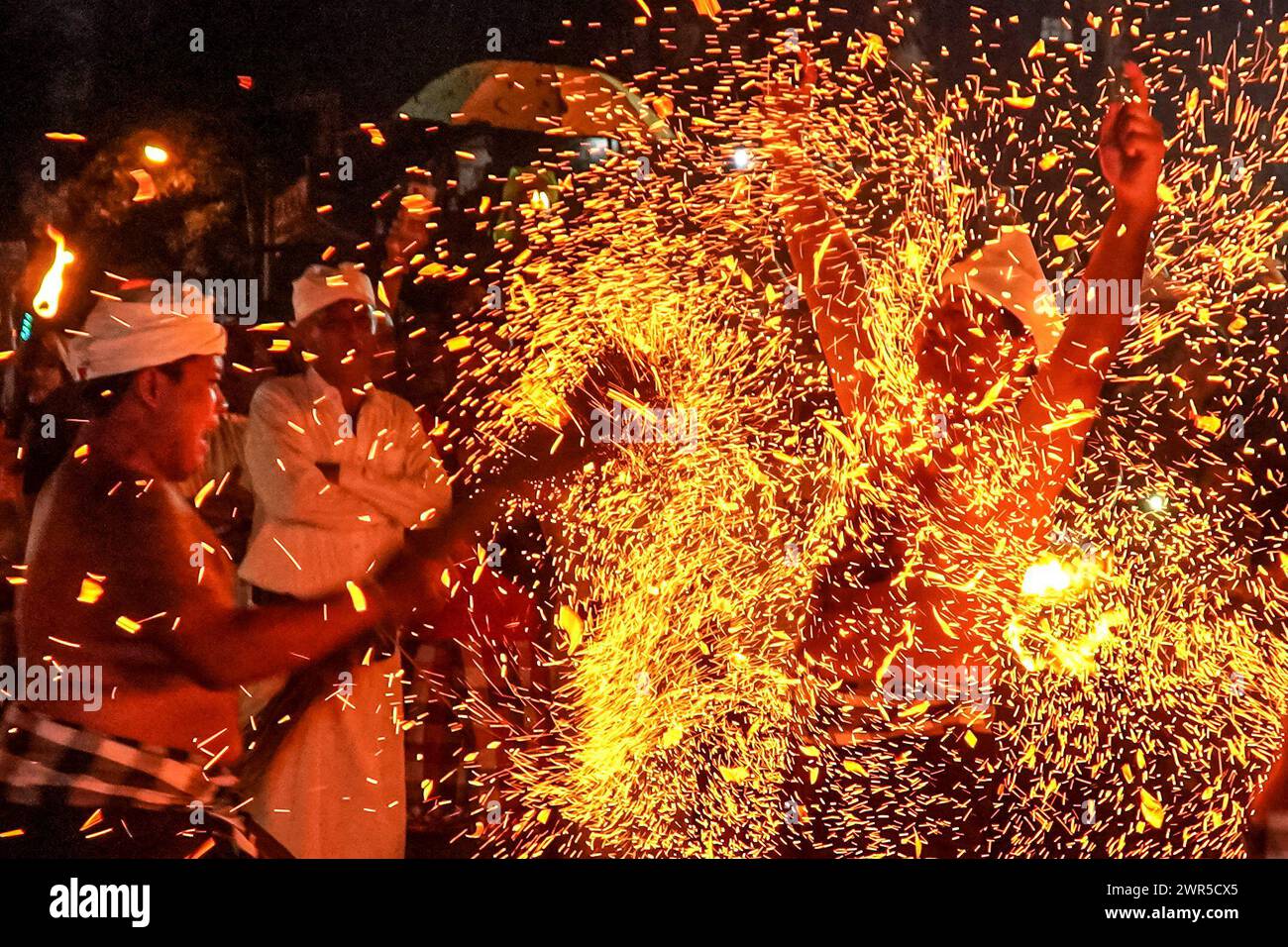 Bali, Indonesia. 10th Mar, 2024. Balinese people perform Lukat Geni ...