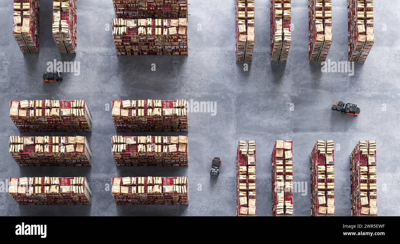Top-down perspective of forklifts navigating through rows of stacked ...