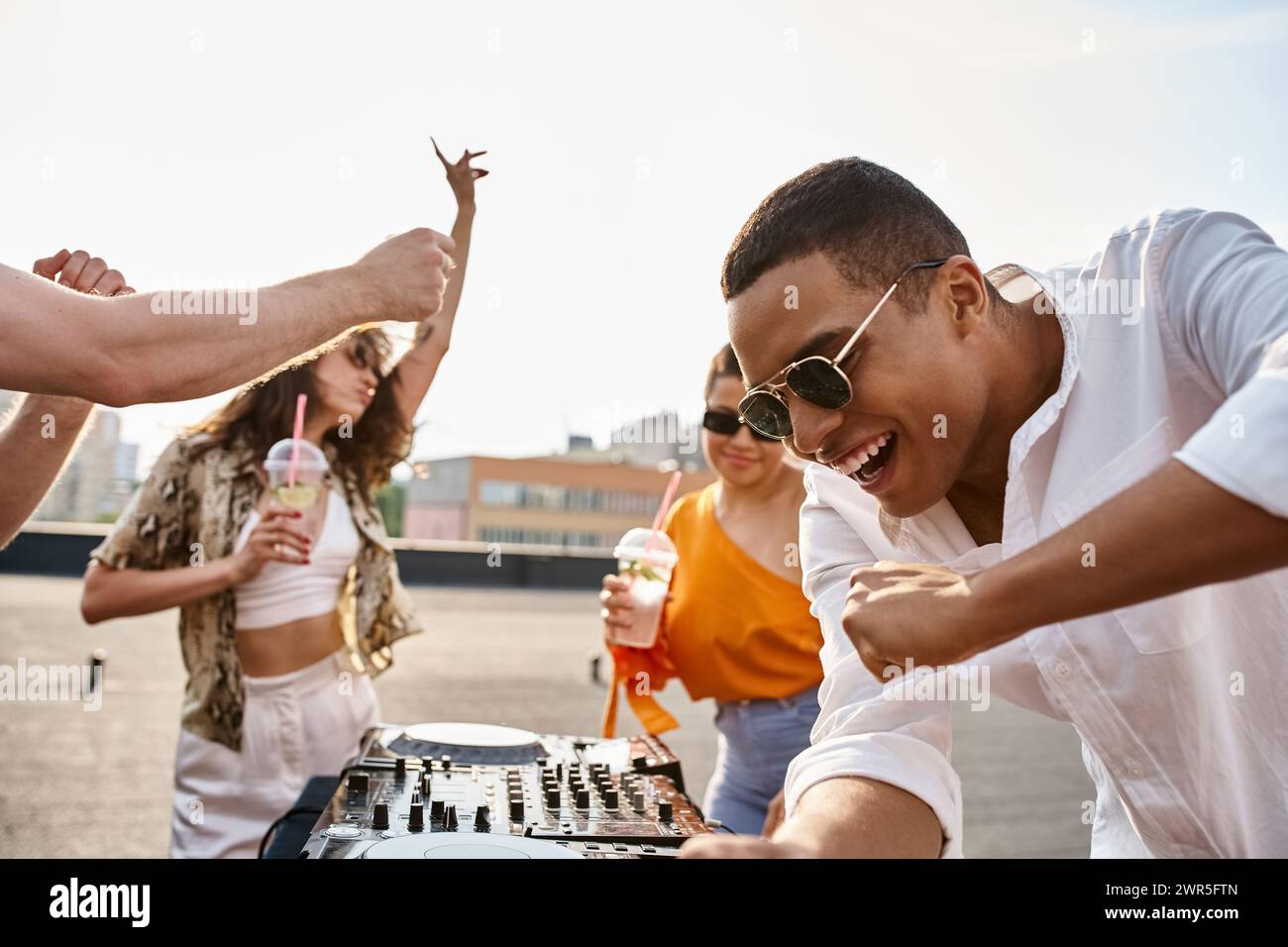 cheerful appealing diverse friends with sunglasses and cocktails ...