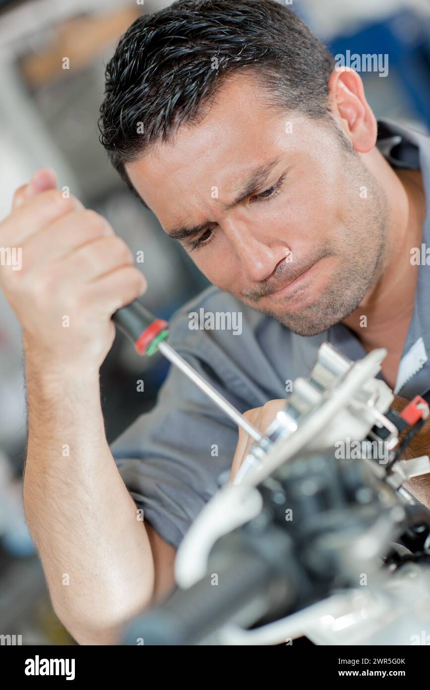 Mechanic frustrated hi-res stock photography and images - Alamy