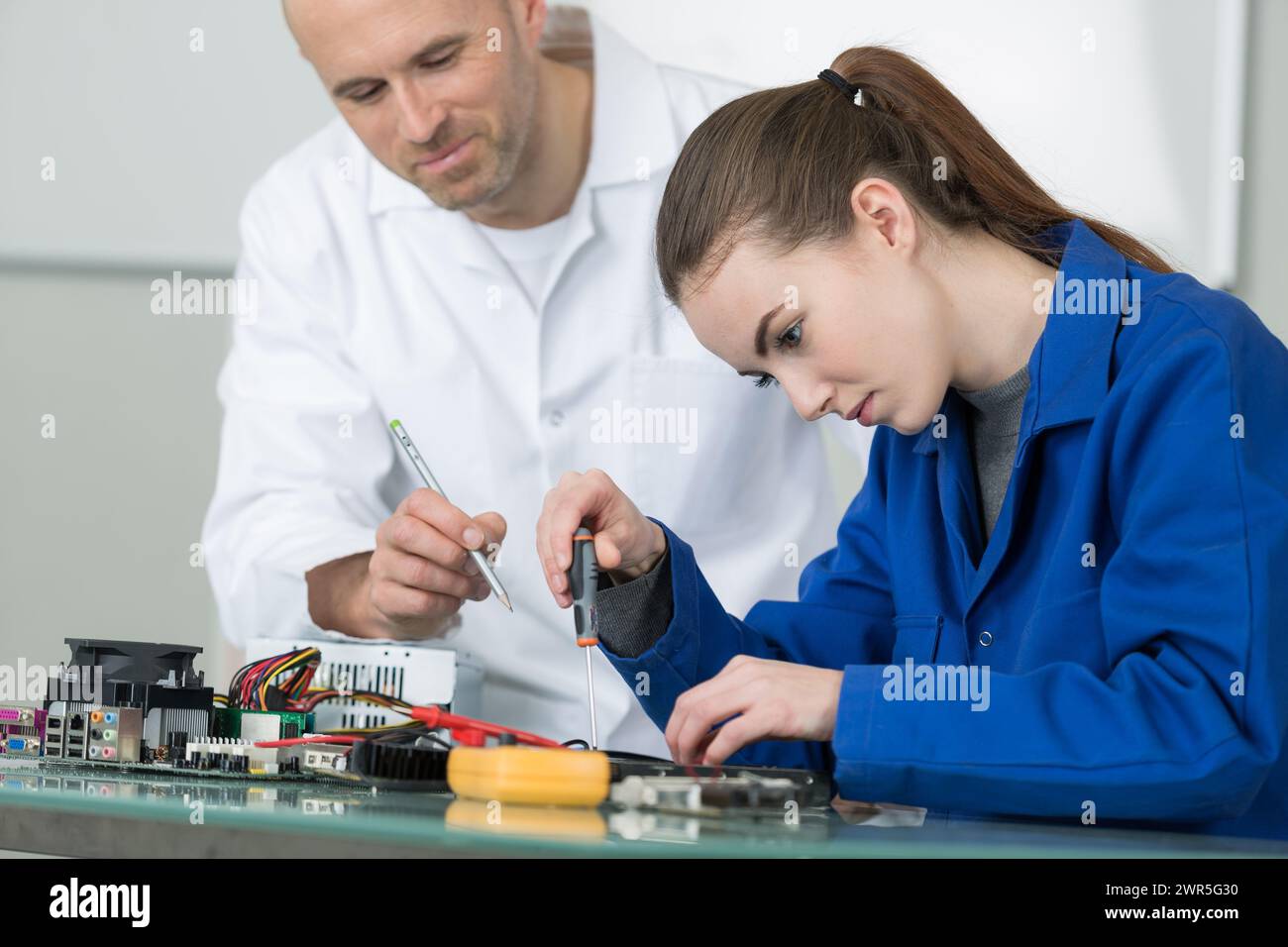 an electronics apprentice during training Stock Photo - Alamy