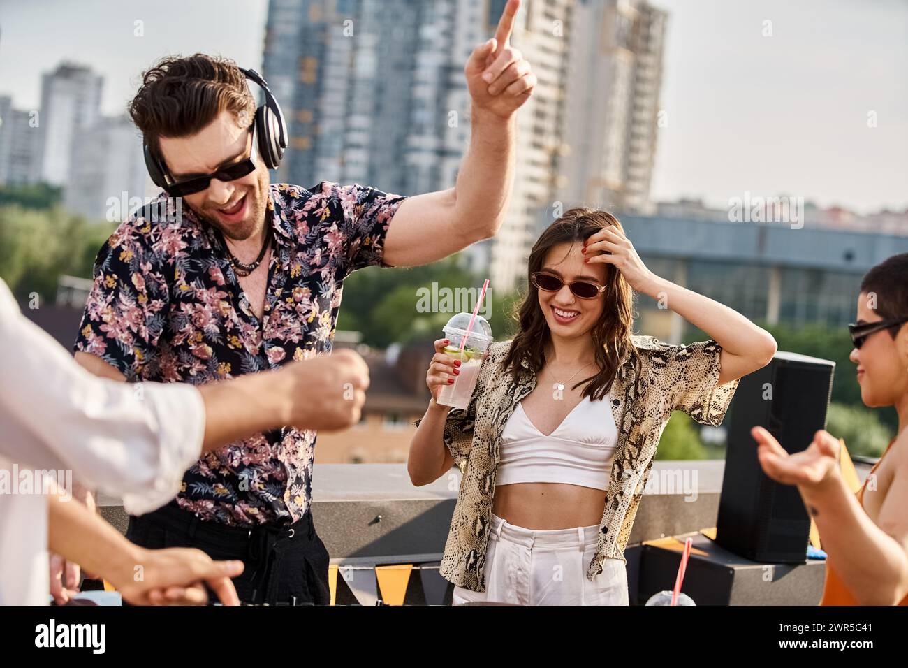 Woman with cocktail in hand hi-res stock photography and images - Alamy