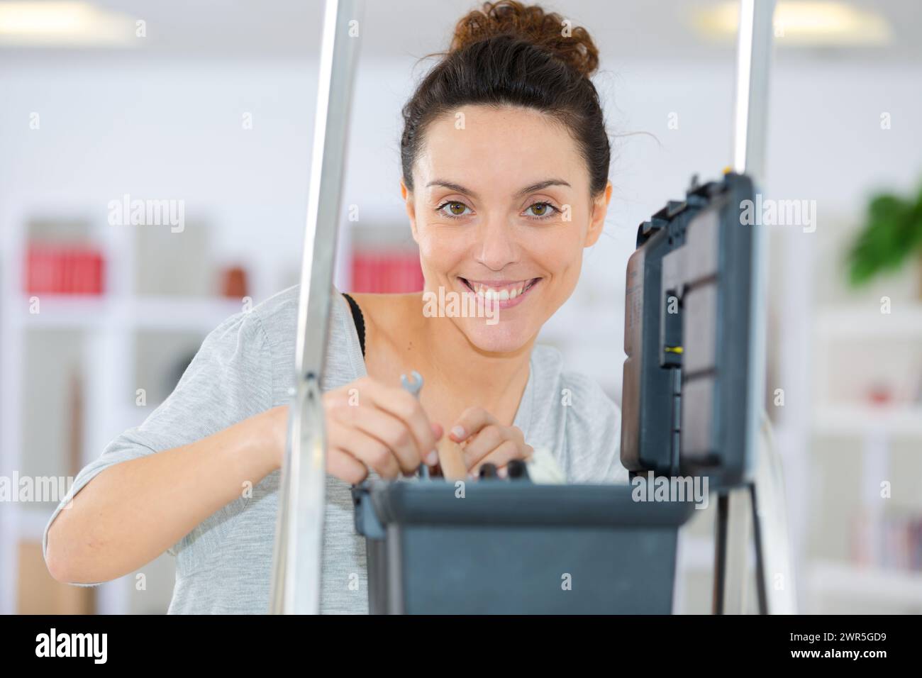 woman posing with a tool box Stock Photo - Alamy